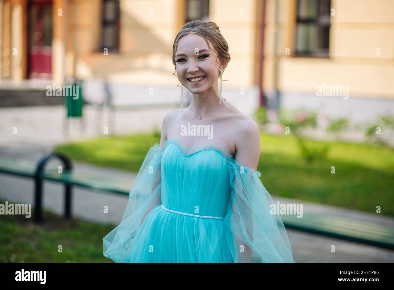 Beautiful schoolgirl in dress at the prom at school Stock Photo - Alamy