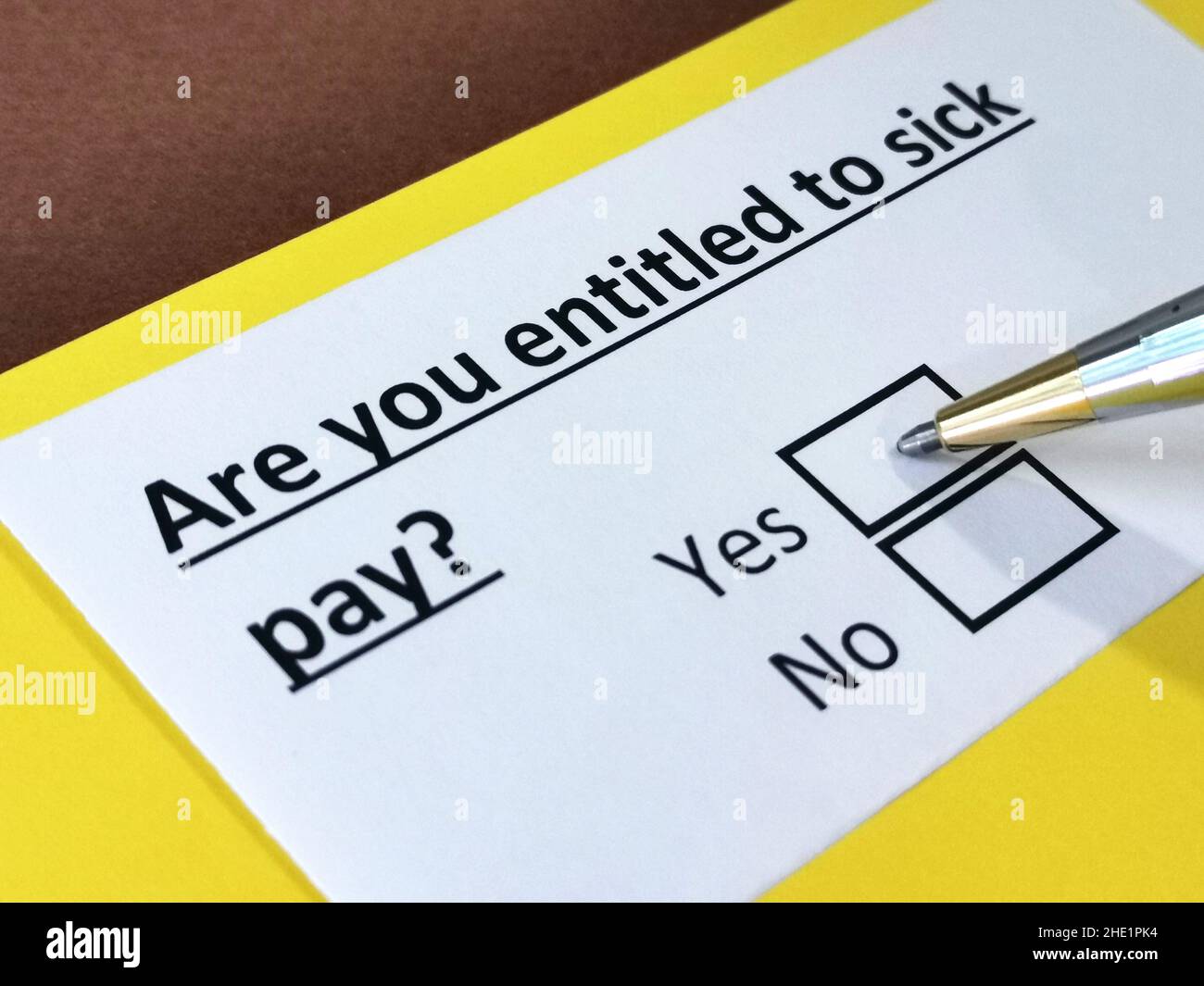 One person is answering question about sick pay Stock Photo - Alamy