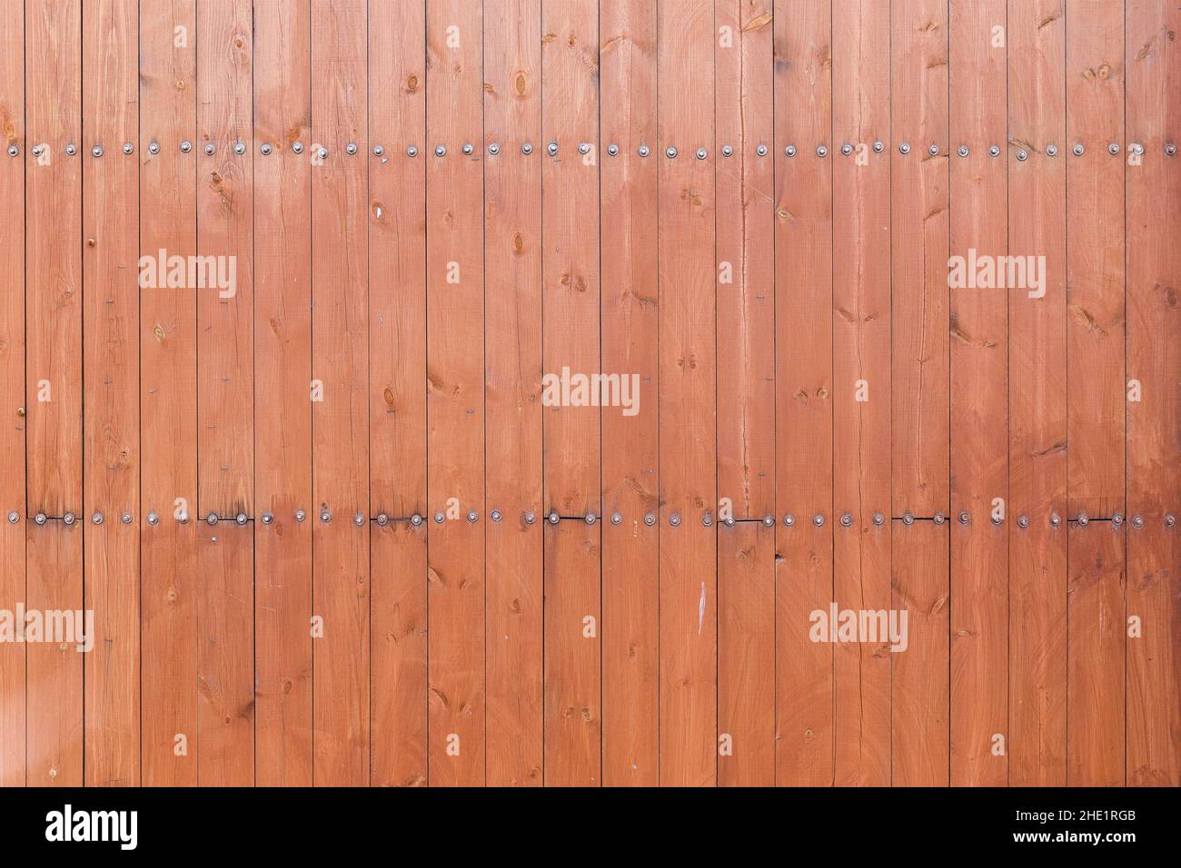 Wooden planks gate texture with iron rivets Stock Photo - Alamy