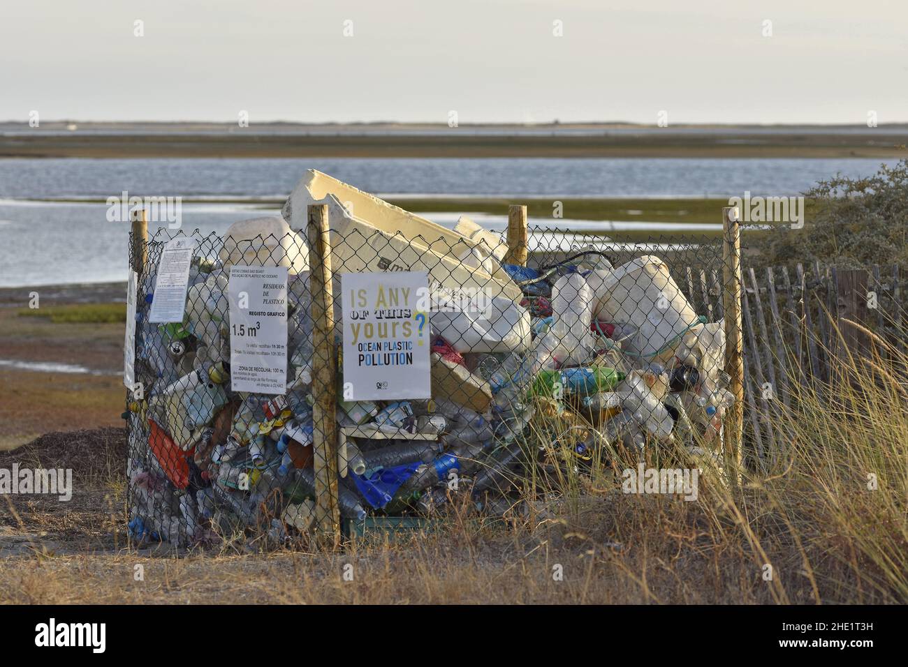 Bin with collected plastic rubbish to rise awareness of ocean pollution ...