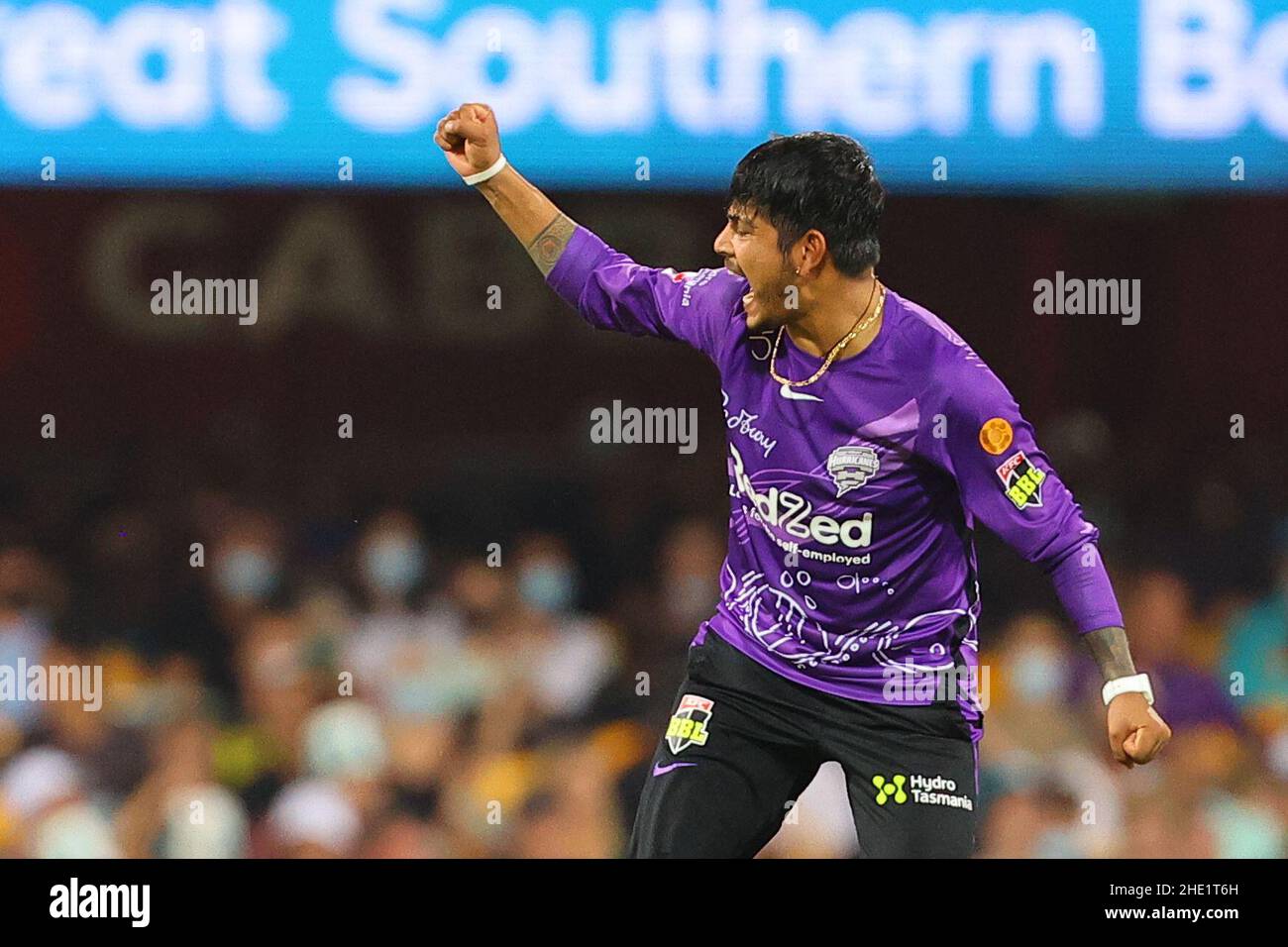 Brisbane, UK. 08th Jan, 2022. Sandeep Lamichhane of the Hobart Hurricanes takes the wicket of ...