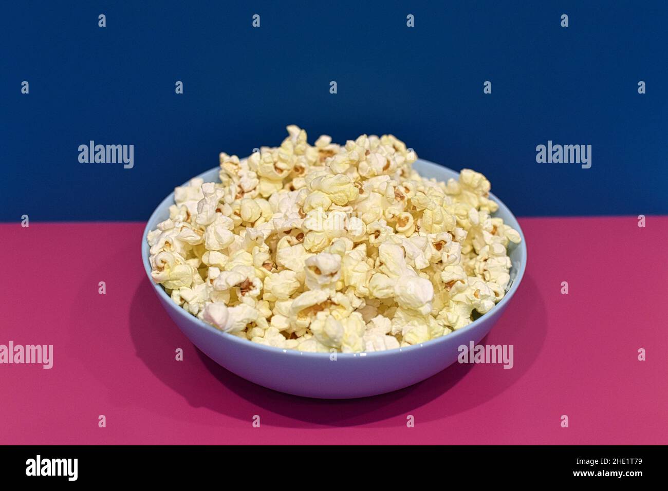 A bowl full of popcorn Stock Photo - Alamy