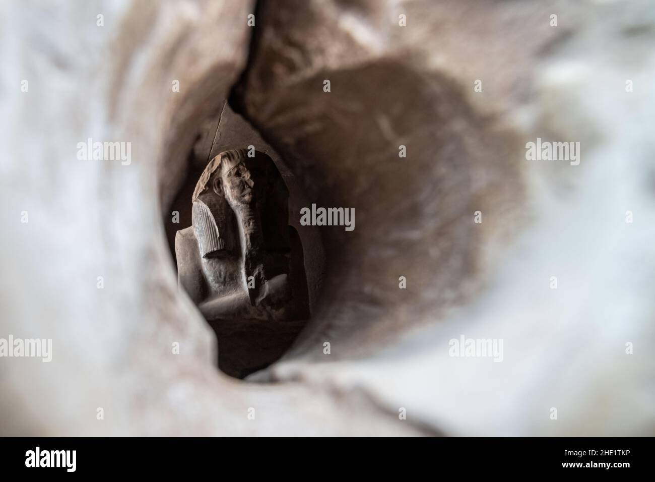 A view of a statue of a pharaoh at the step pyramid of Djoser in the ...