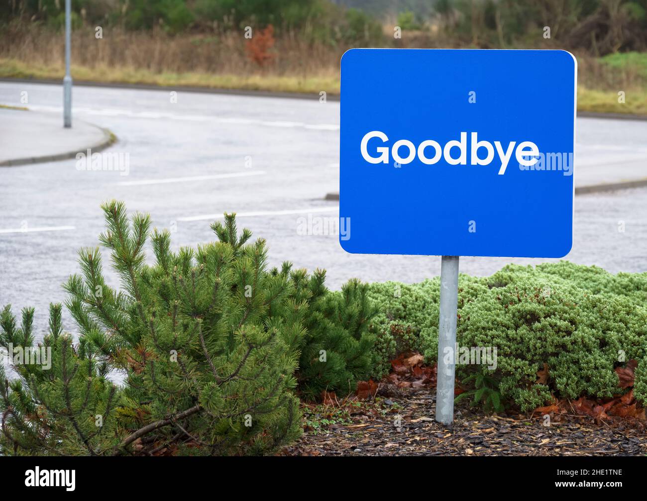 Goodbye sign on blue background at carpark exit Stock Photo - Alamy