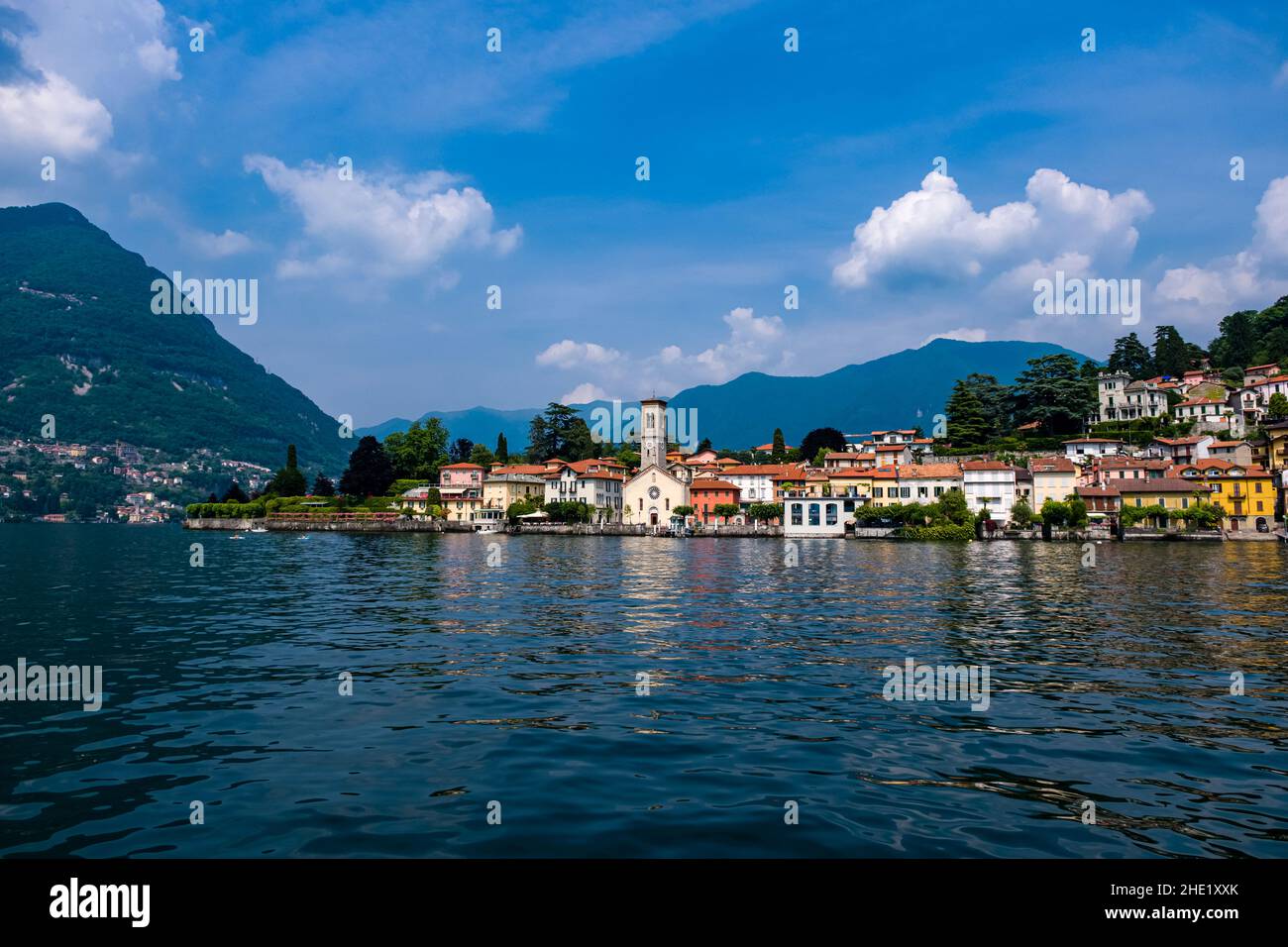 View of the lakeside of town, including the church of Santa Tecla ...