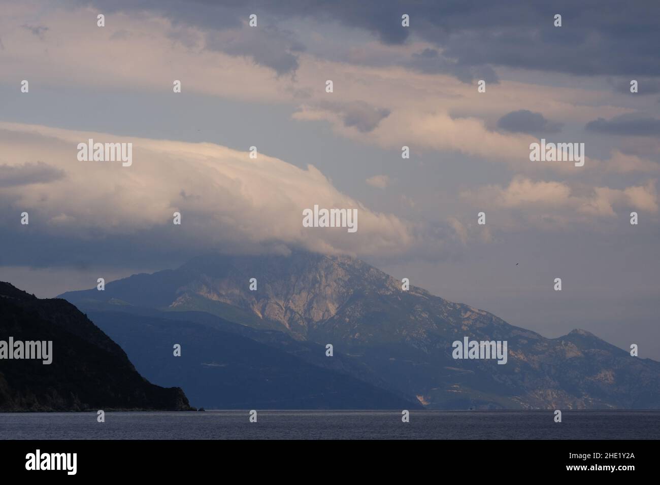 Holy Mount Athos mountain in Greece, Halkidiki during sunset Stock ...