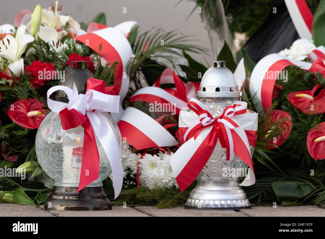 Red and white candles and flowers in the colors of the Polish flag ...