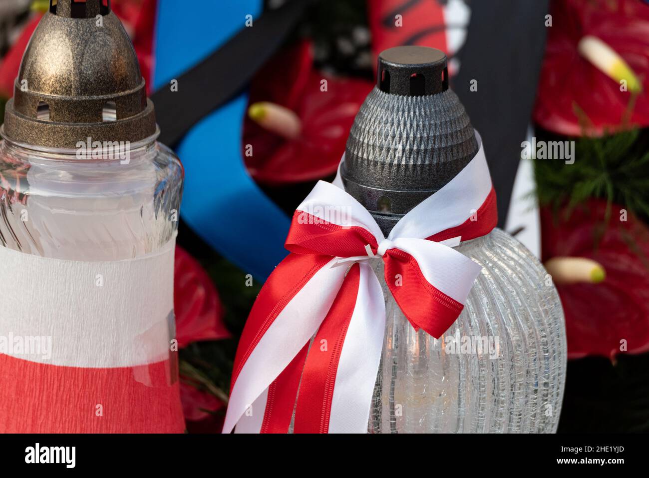 Red and white candles and flowers in the colors of the Polish flag ...