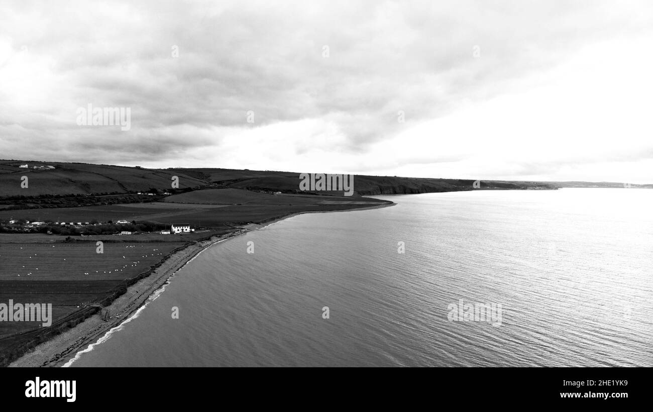 Aerial image overlooking Llanon coast showing the sea, coastal path ...