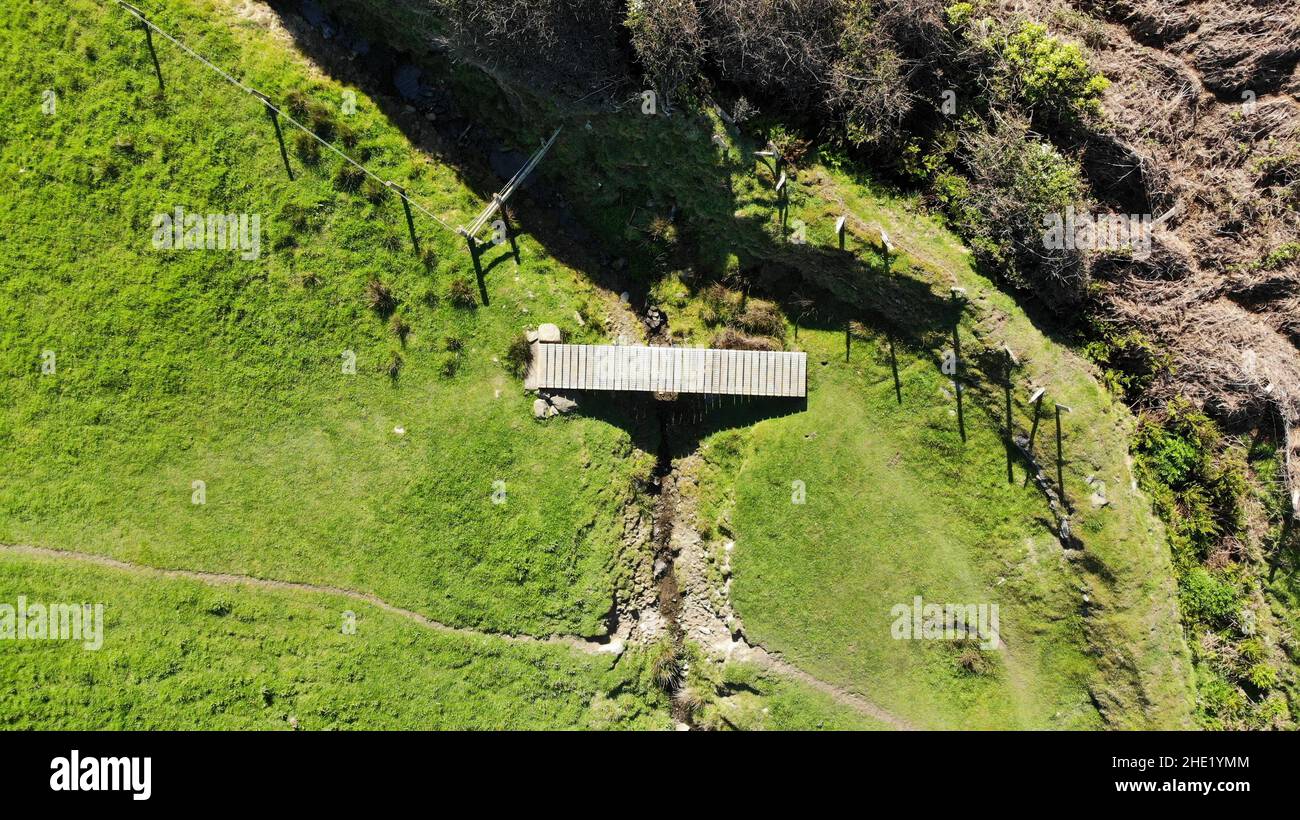 Aerial image of a wooden bridge along the Llanon, Ceredigion coastal ...