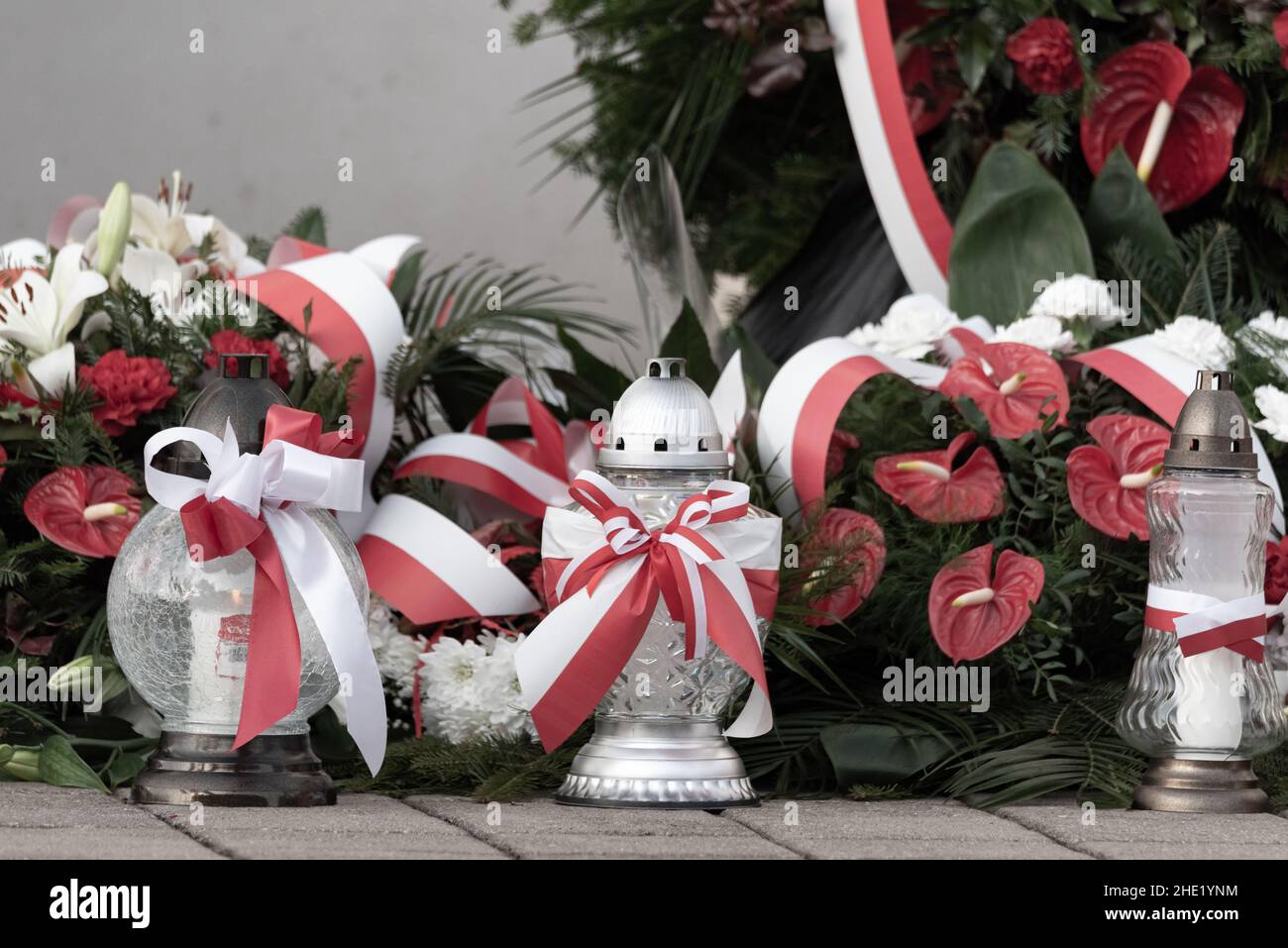 Red and white candles and flowers in the colors of the Polish flag ...
