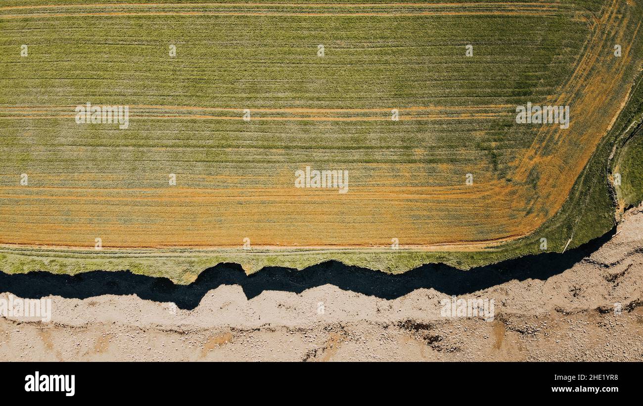 Aerial image of fields, beach and coastal path in Llanon Ceredigion ...