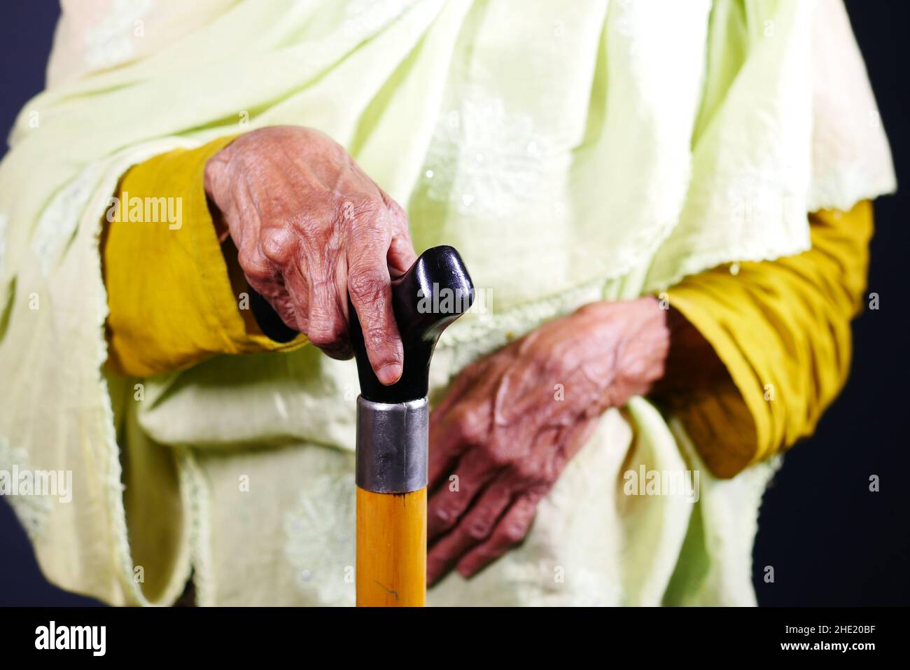 Hands on walking stick hi-res stock photography and images - Alamy