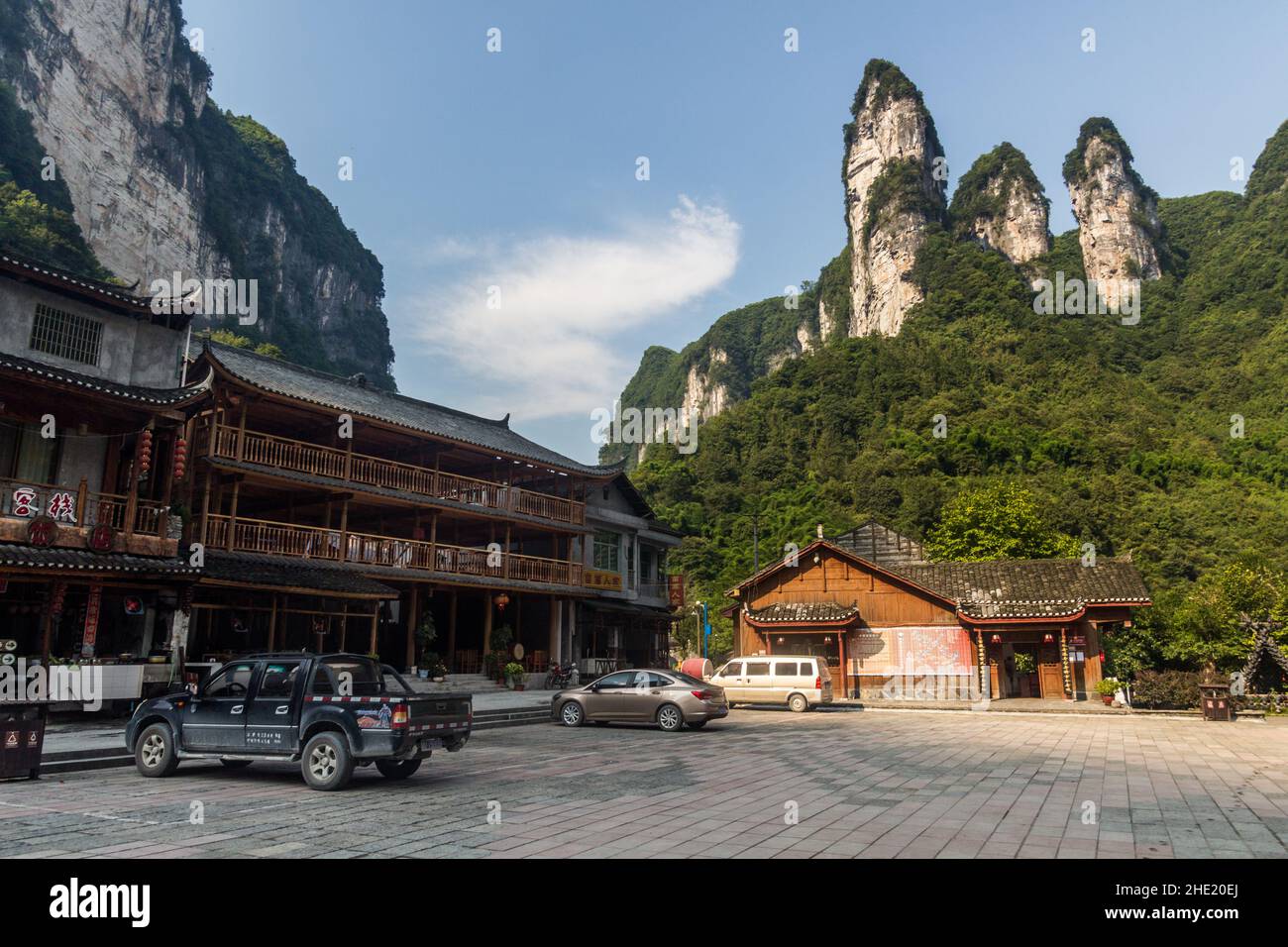 DEHANG, CHINA - AUGUST 12, 2018: Limestone cliffs above square in ...