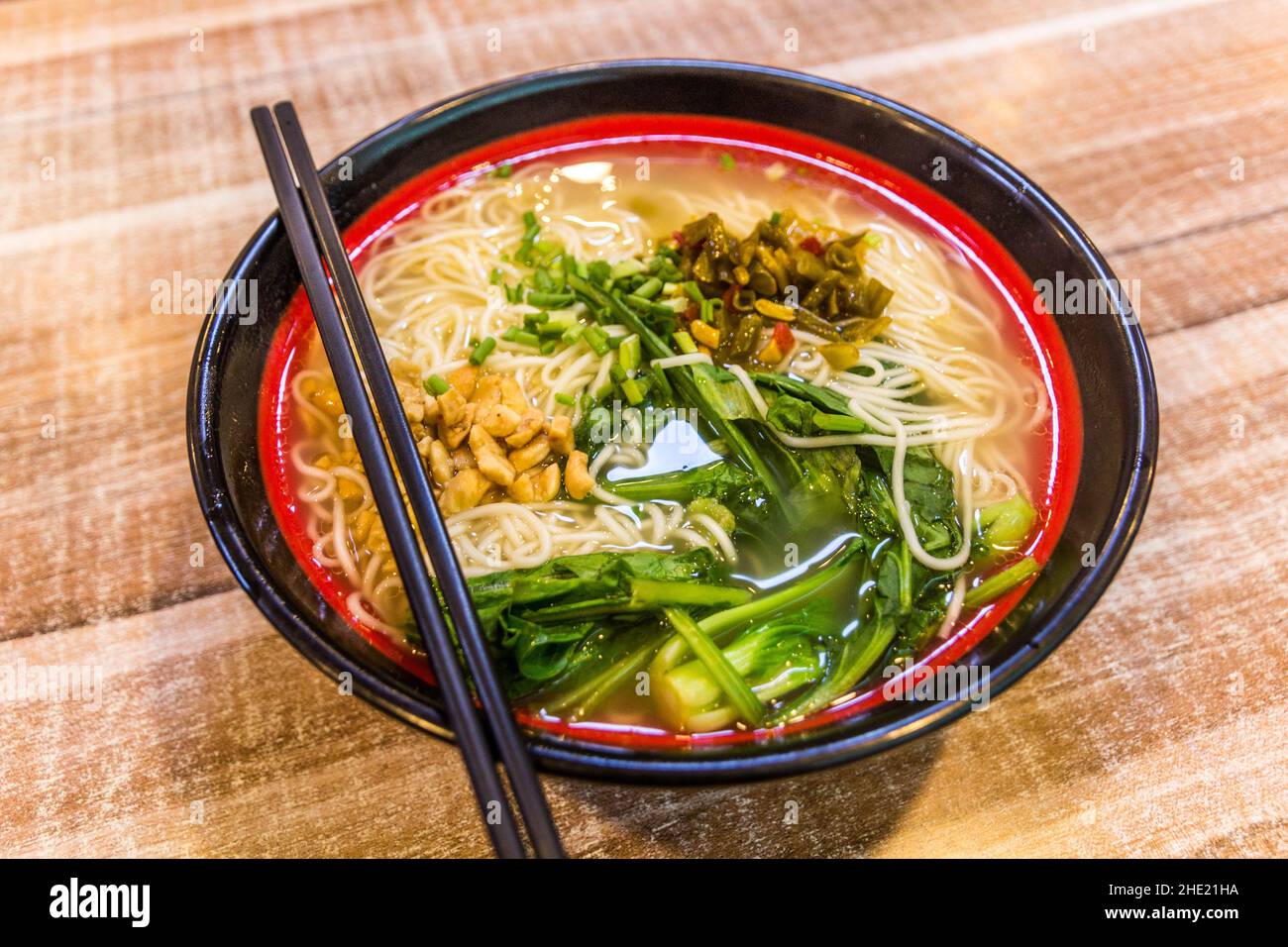Meal in China - bowl of Sichuan noodles Stock Photo - Alamy