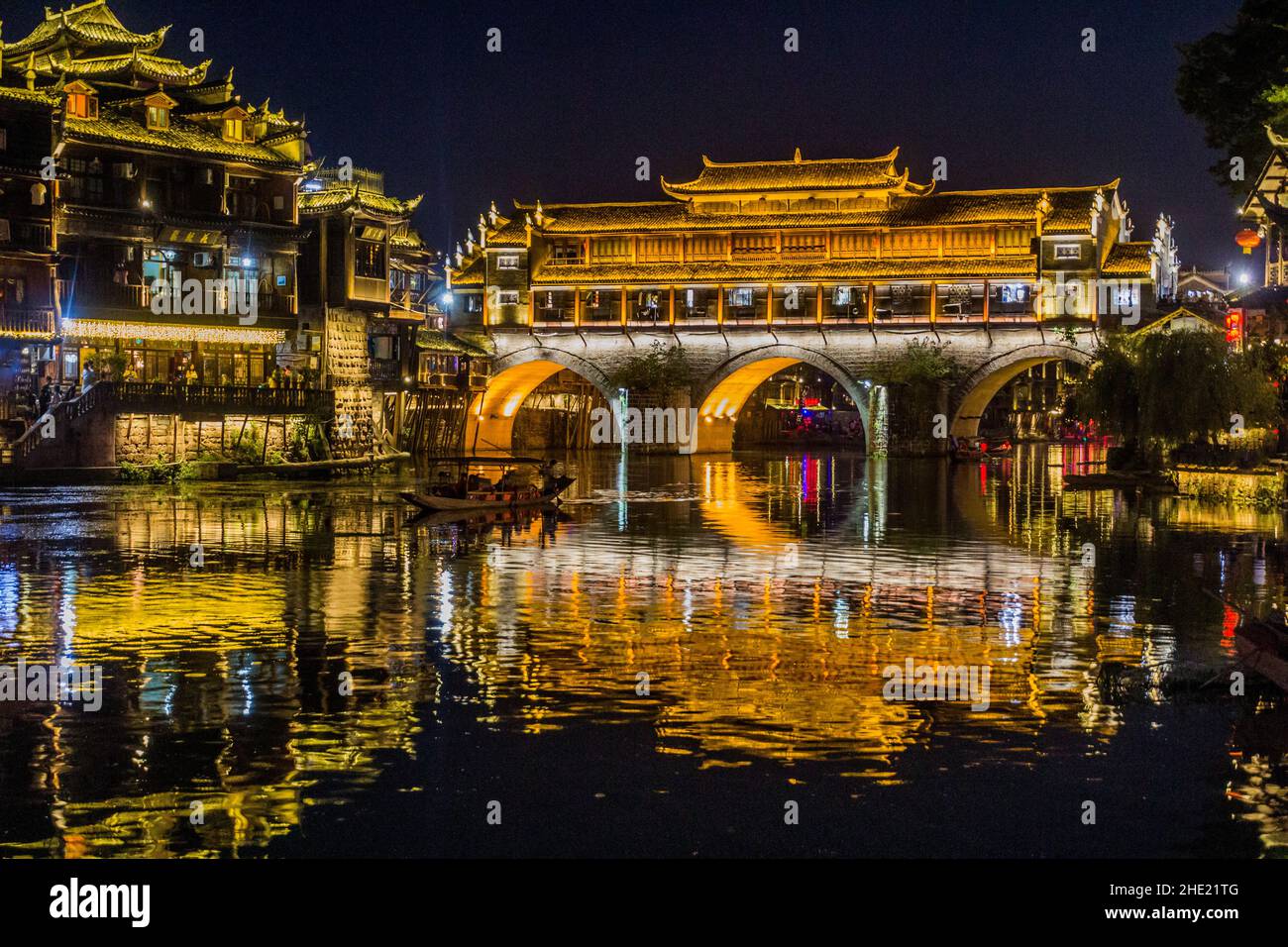 Evening view of Hong bridge in Fenghuang Ancient Town, Hunan province ...
