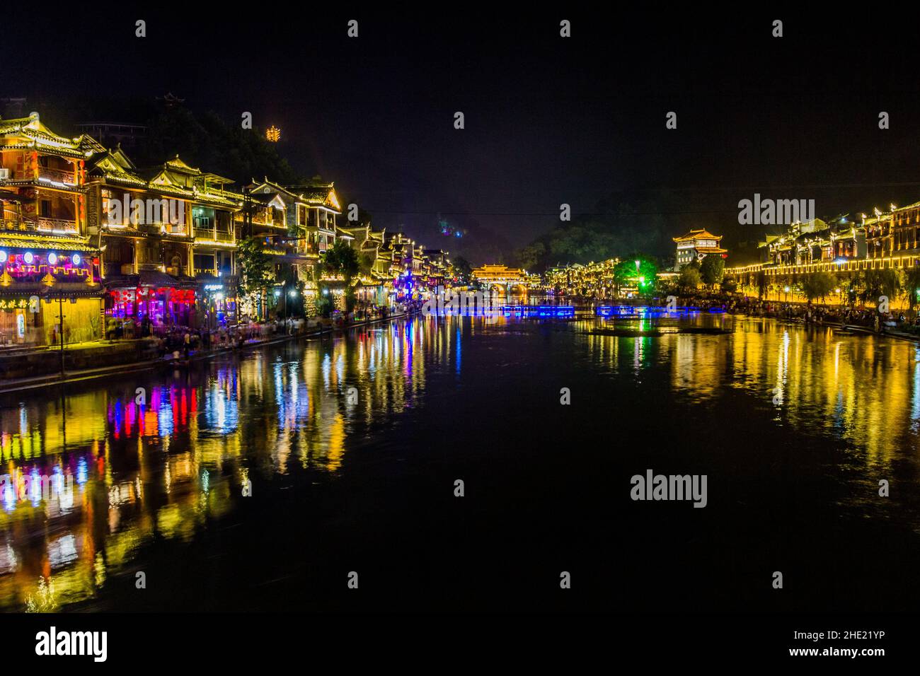 Evening view of Fenghuang Ancient Town with Tuo river, Hunan province ...
