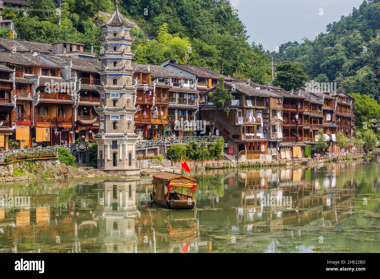 Riverside buildings and Wanming Pagoda in Fenghuang Ancient Town, Hunan ...
