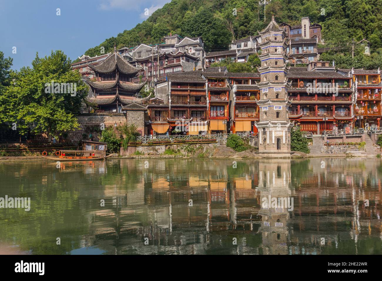 Riverside buildings and Wanming Pagoda in Fenghuang Ancient Town, Hunan ...