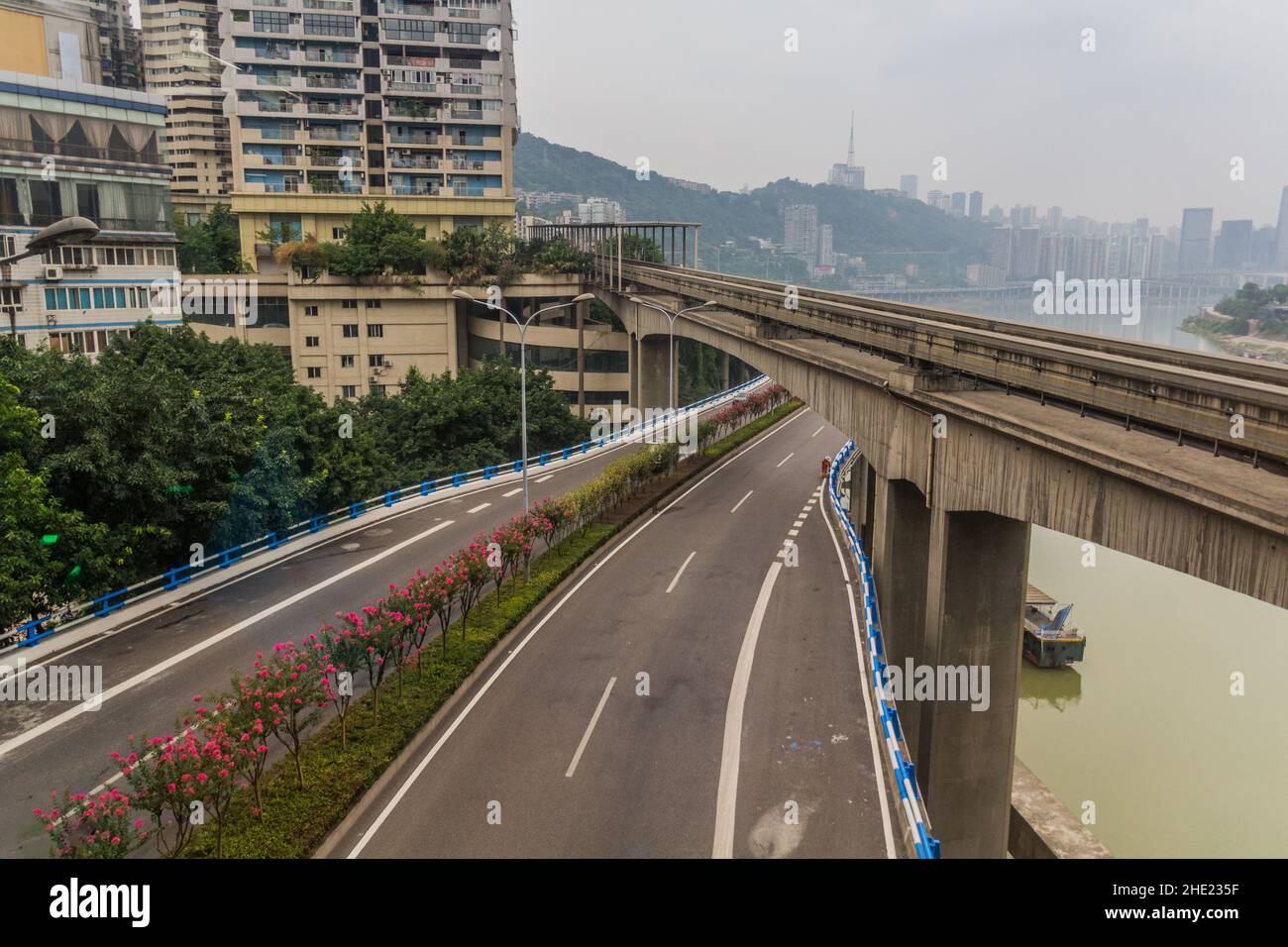 Monorail line crossing a highway in Chongqing, China Stock Photo - Alamy