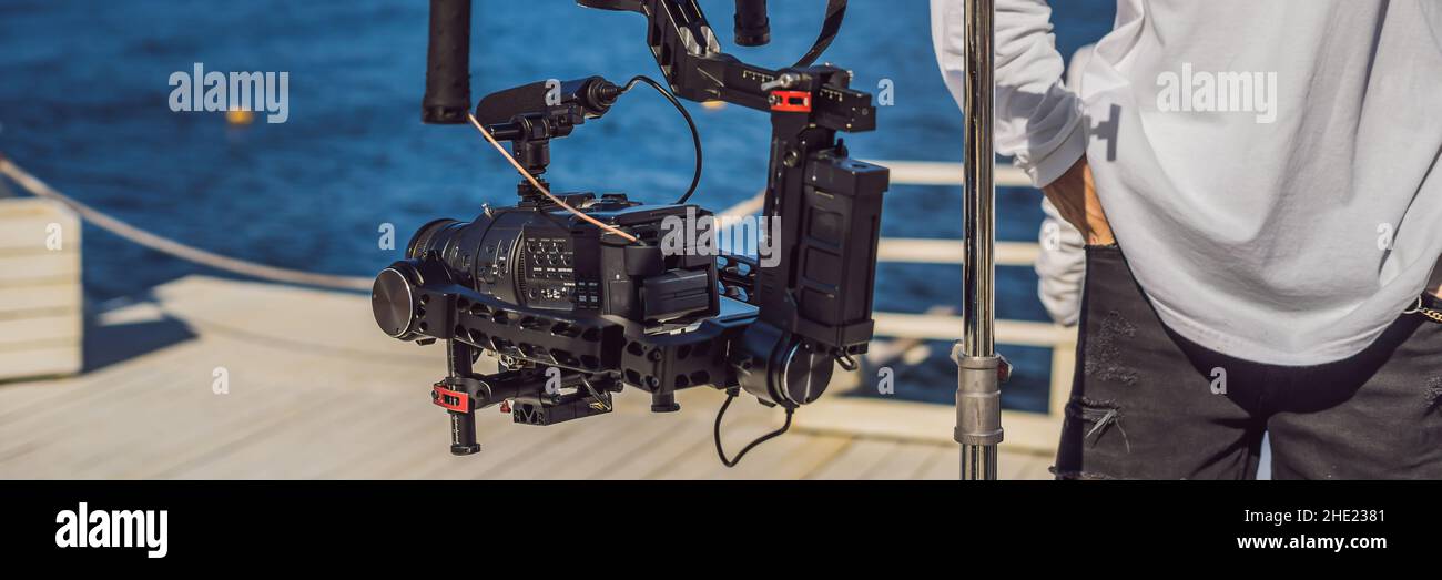 profeccional cinema camera on a 3-axis camera stabilizer system on a ...