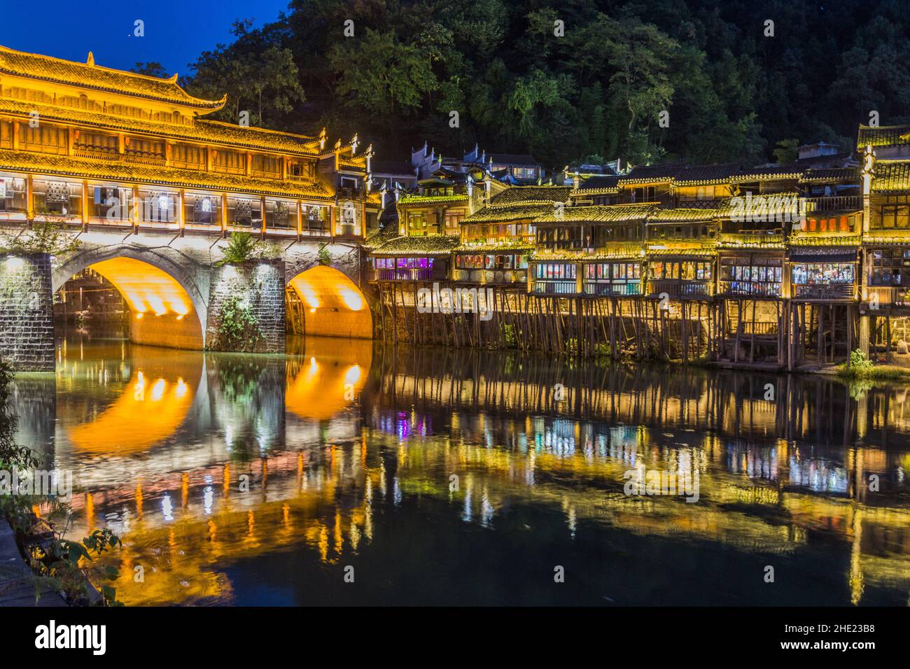 Evening view of Hong bridge in Fenghuang Ancient Town, Hunan province ...