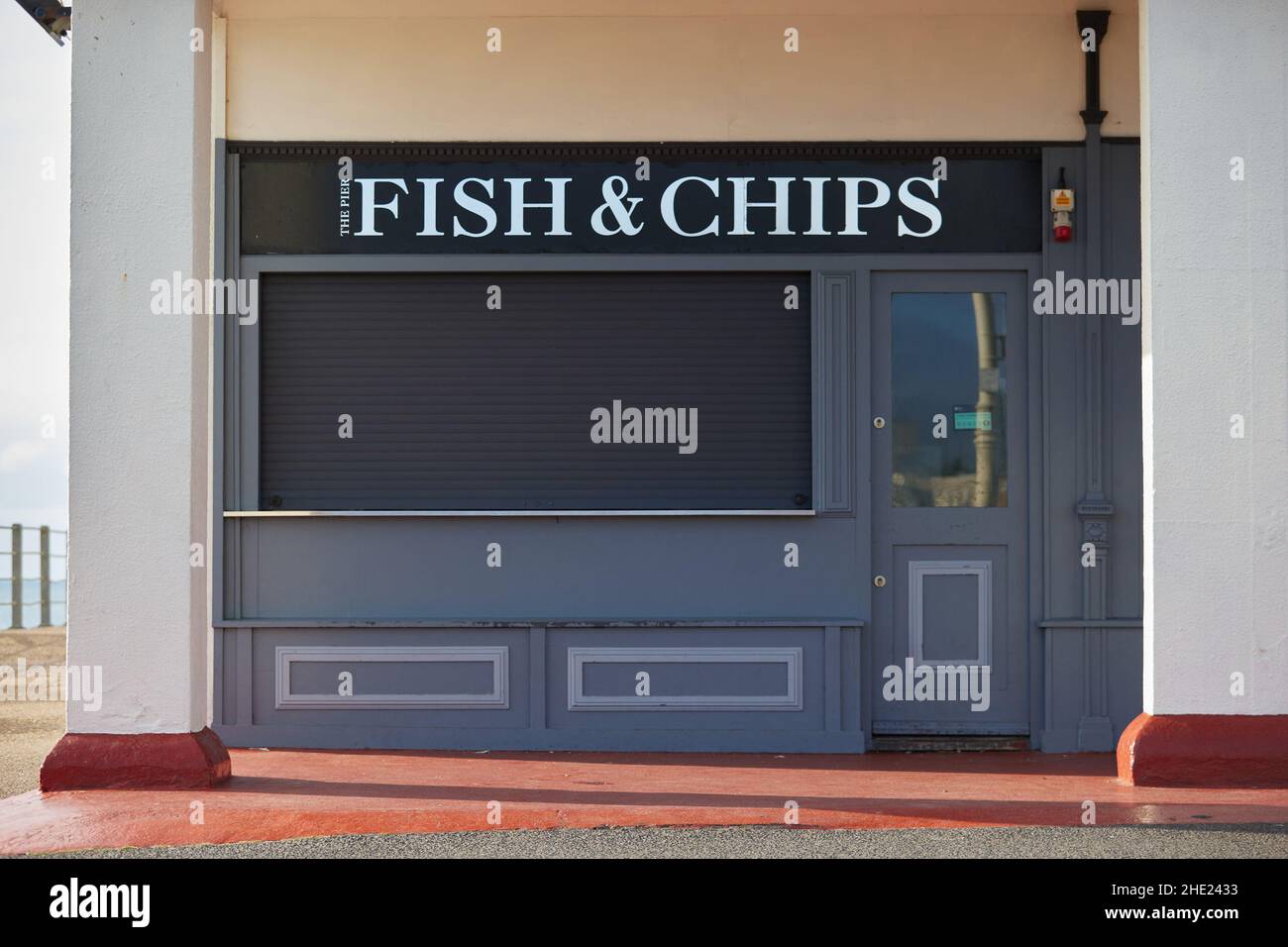 Exterior view of a fish and chips shop on the seashore of Bognor Regis ...
