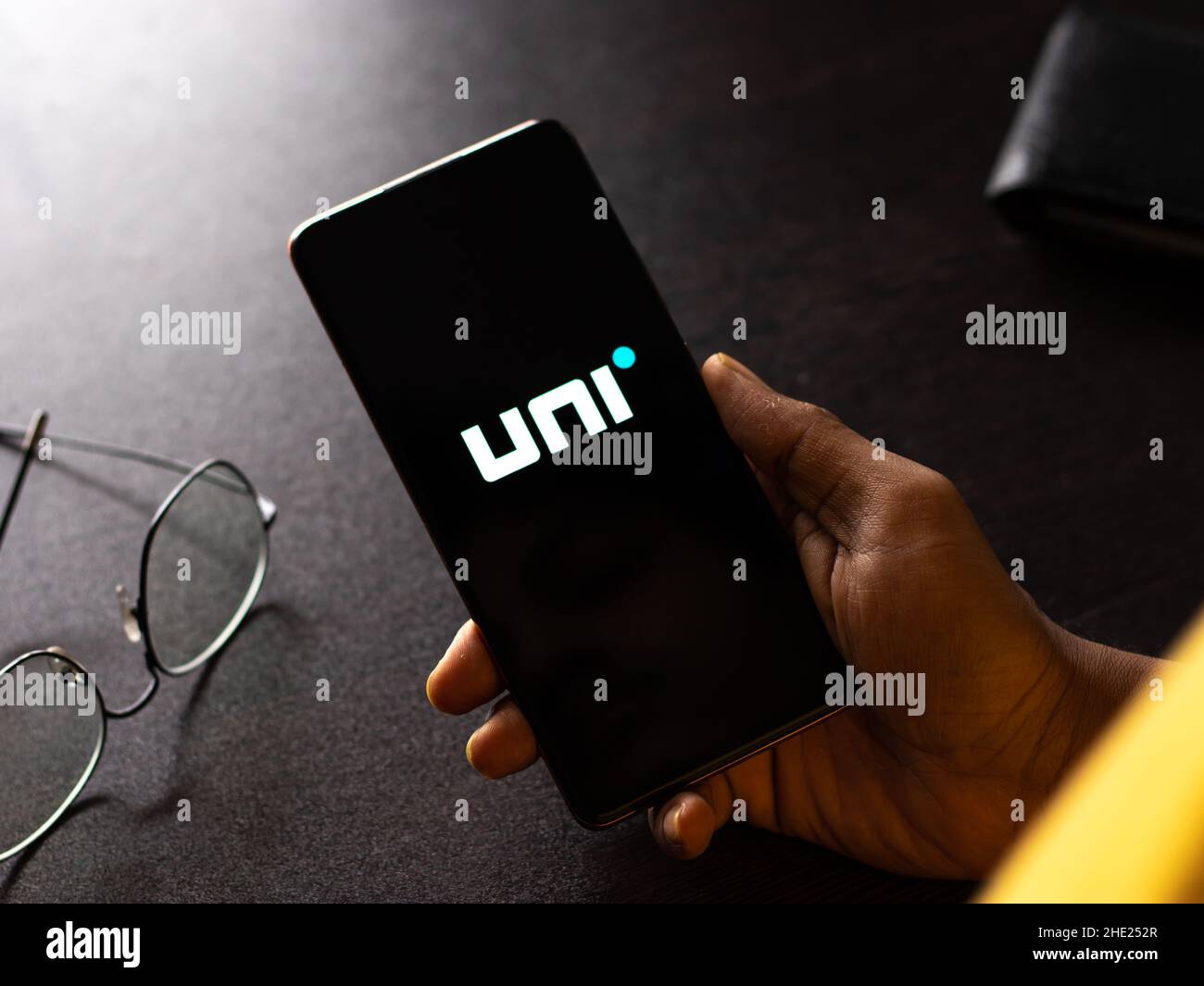 West Bangal, India - December 15, 2021 : Uni cards logo on phone screen ...