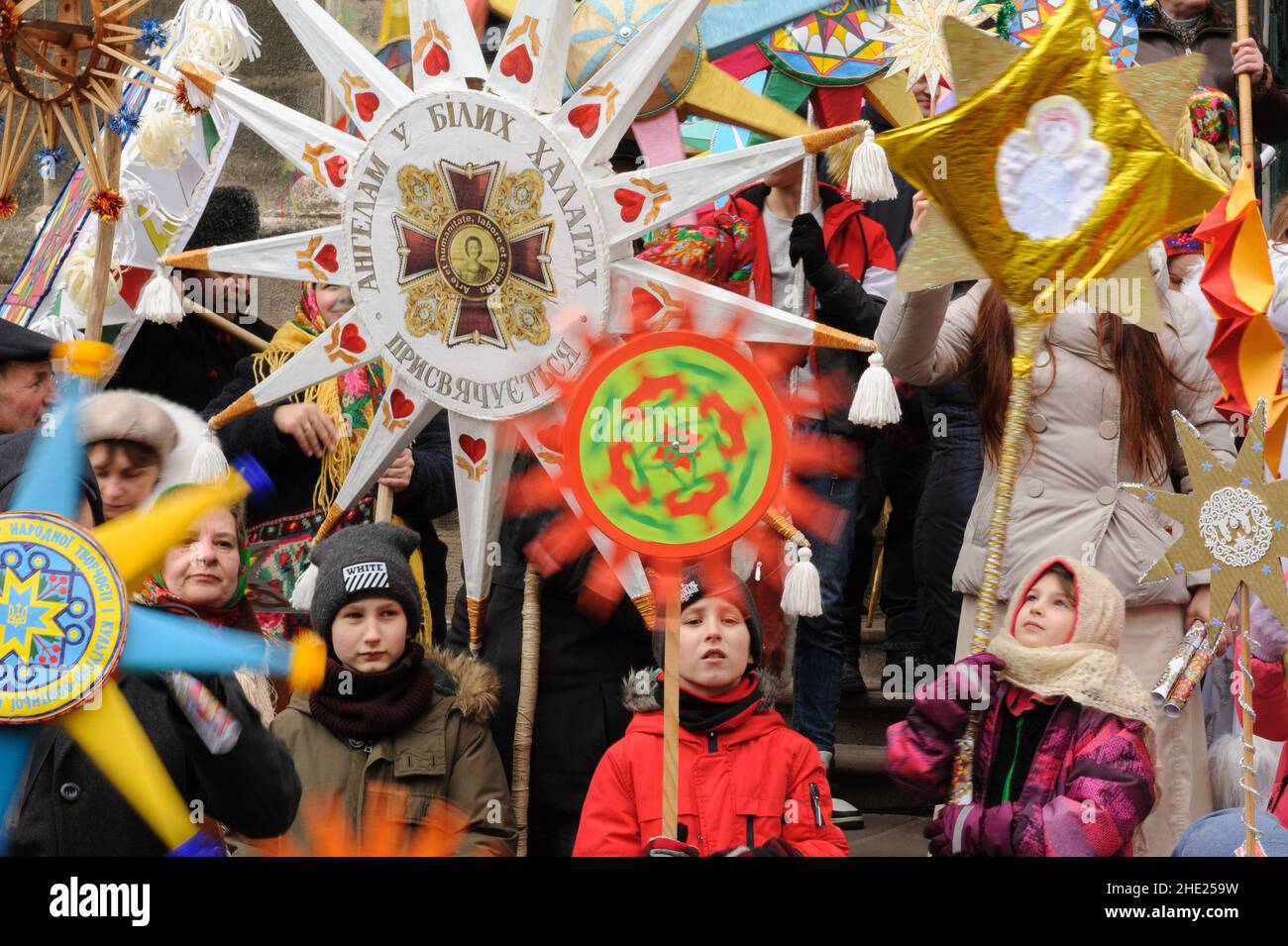 Lviv, Ukraine, 8 January 2022. Children hold stars during procession of ...