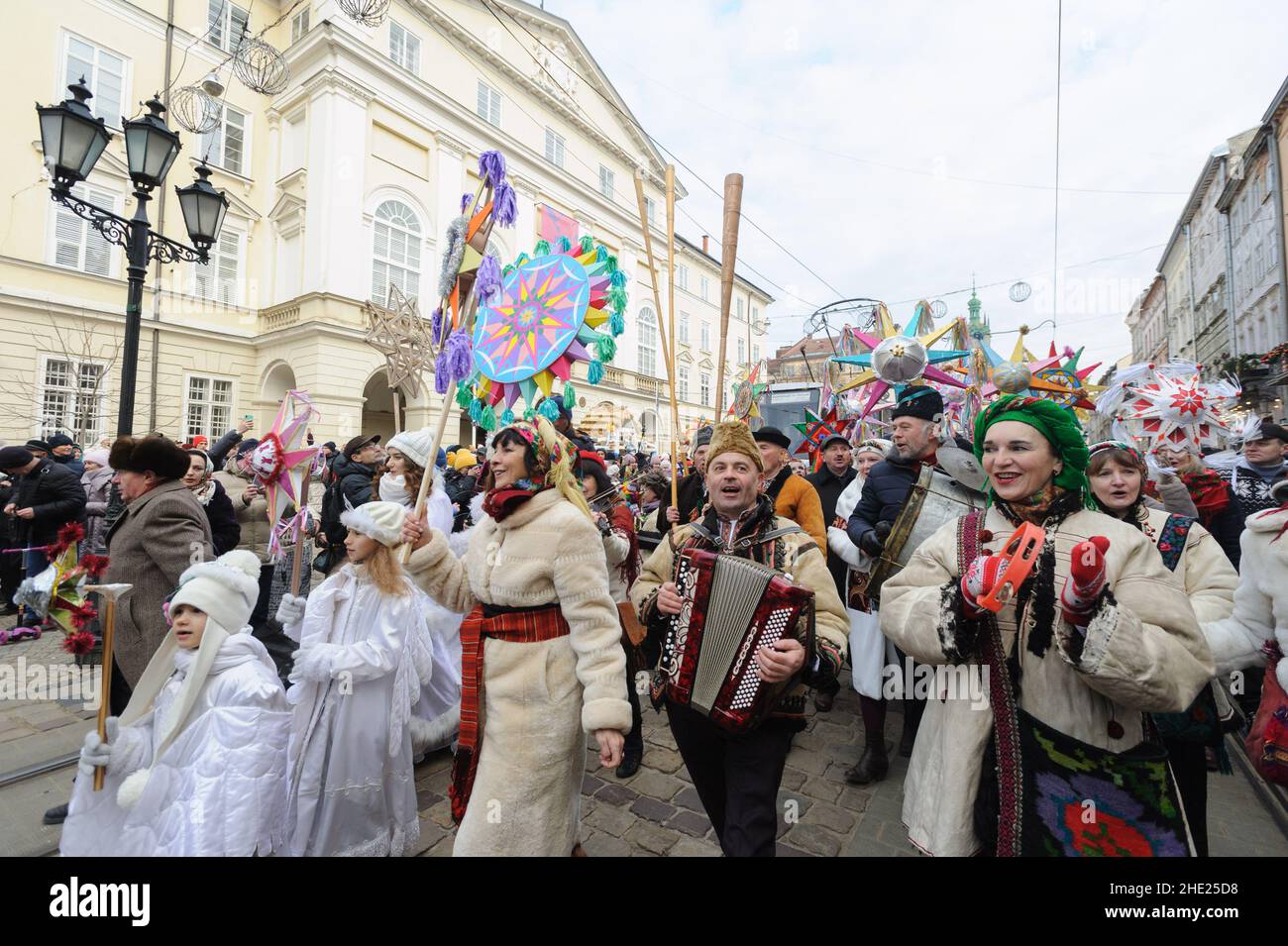 Lviv, Ukraine, 8 January 2022. Carollers during procession of zvizdari ...