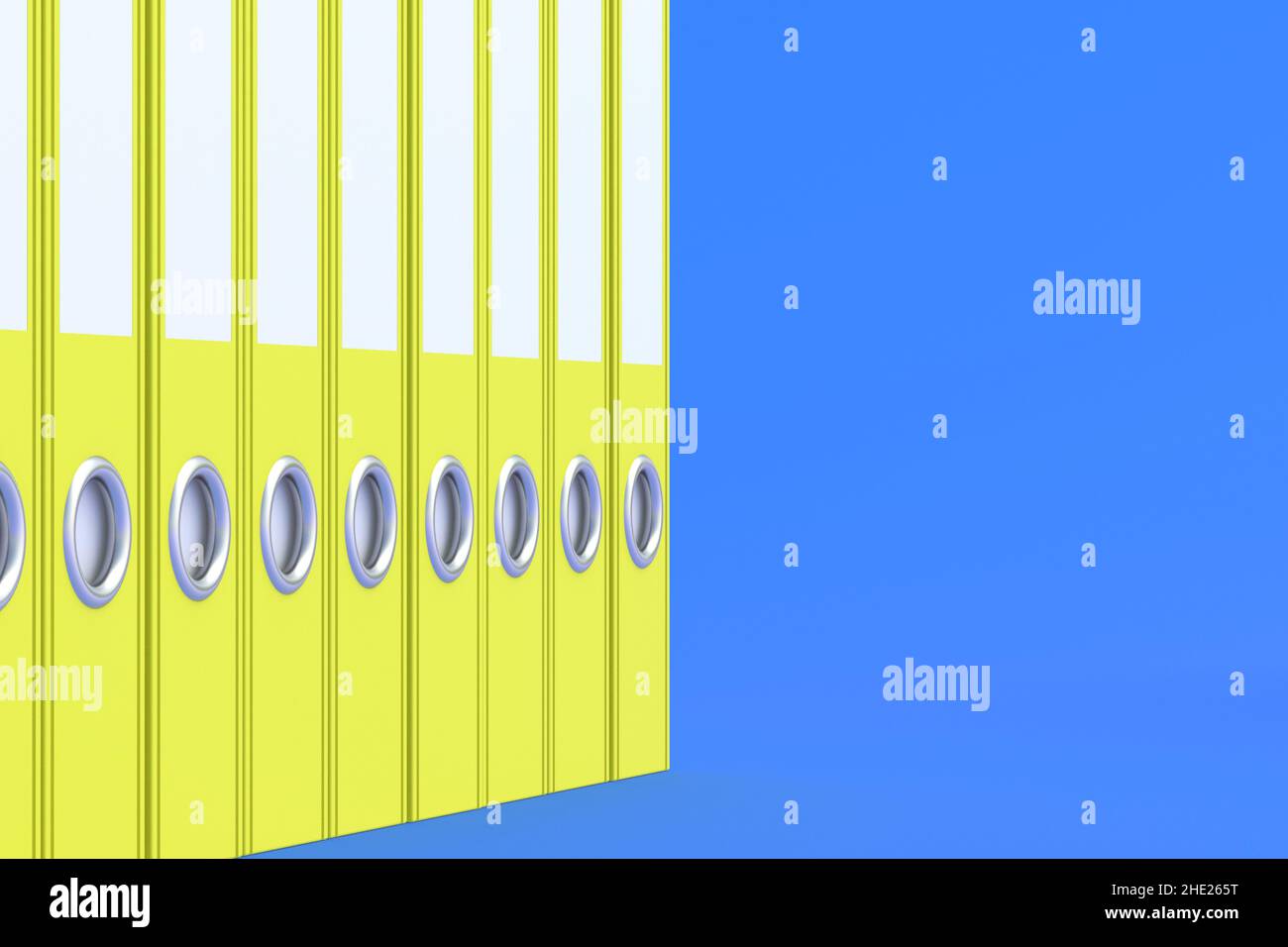 Row of binder file folders of yellow color on blue background. Copy ...