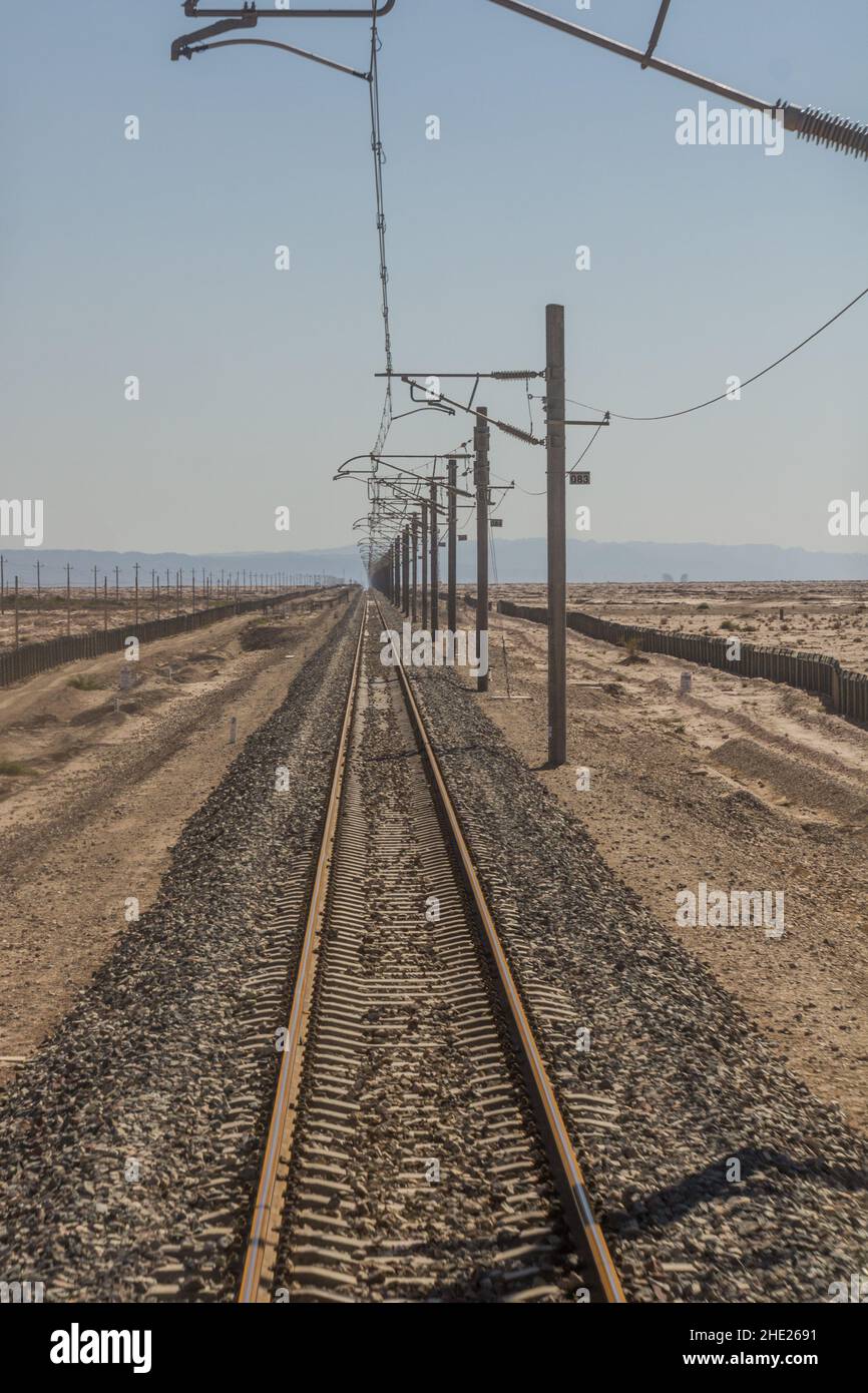 Railway line through Gobi desert near Dunhuang, Gansu province, China ...