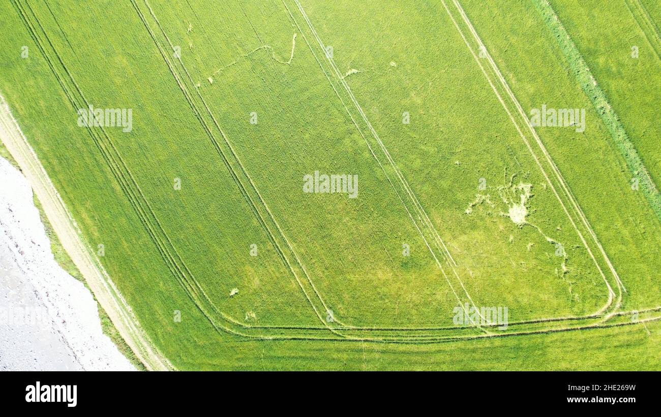 Aerial image of fields, beach and coastal path in Llanon Ceredigion ...