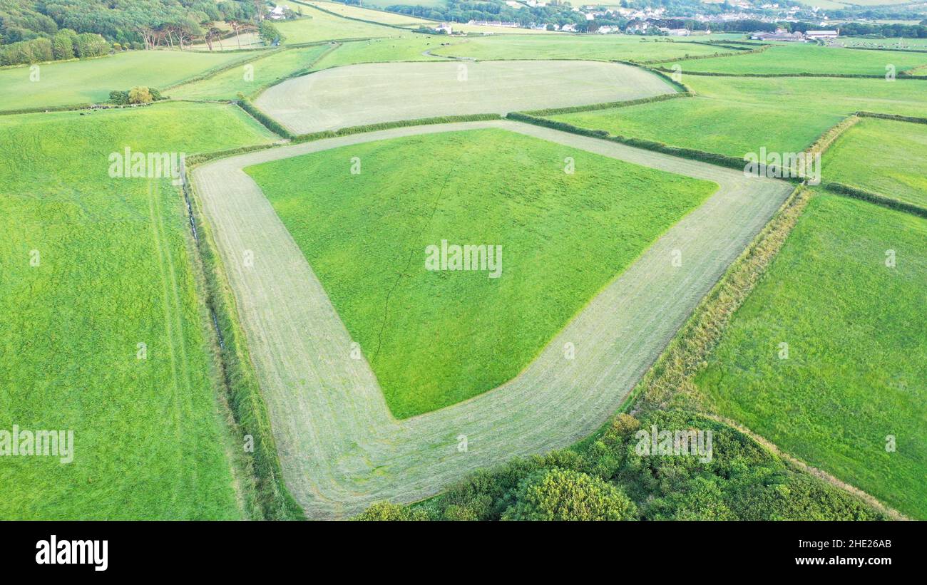 Aerial image looking over fields to the village of Llanon, showing ...