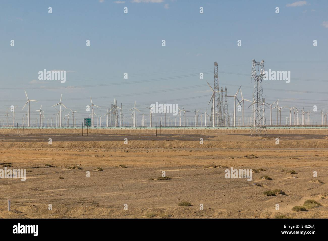 Wind power plants and electric pylons in the Gobi desert, Gansu ...