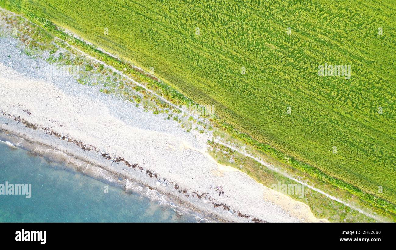 Aerial image of fields, beach and coastal path in Llanon Ceredigion ...