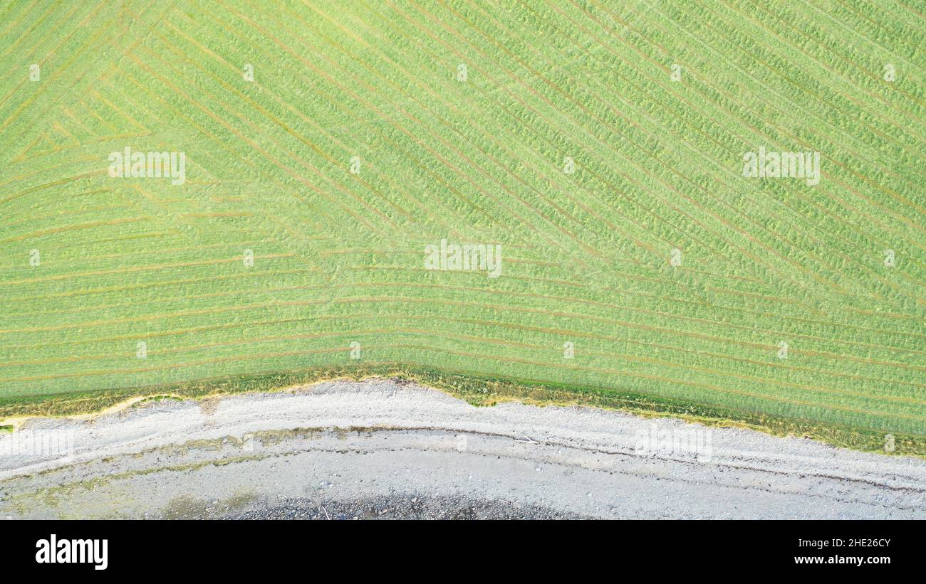 Aerial image of fields, beach and coastal path in Llanon Ceredigion ...