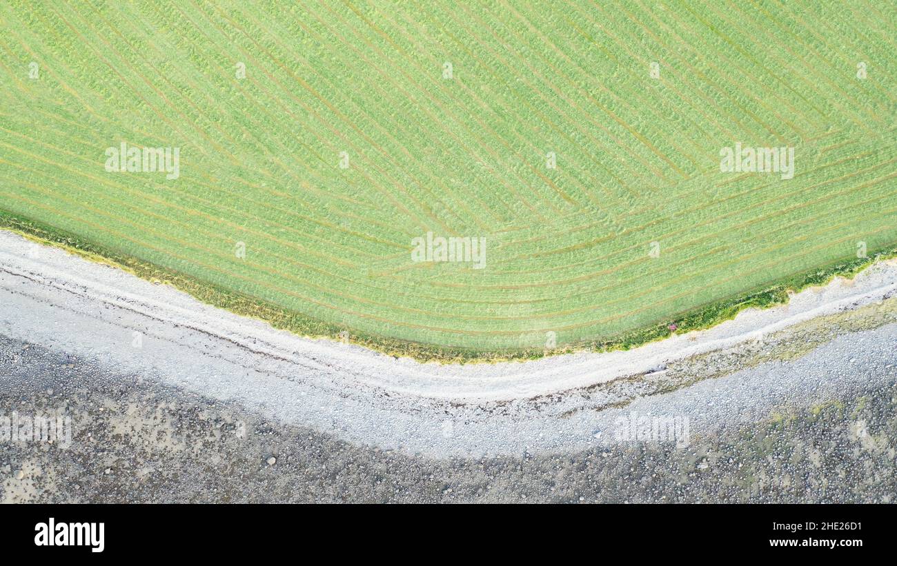 Aerial image of fields, beach and coastal path in Llanon Ceredigion ...