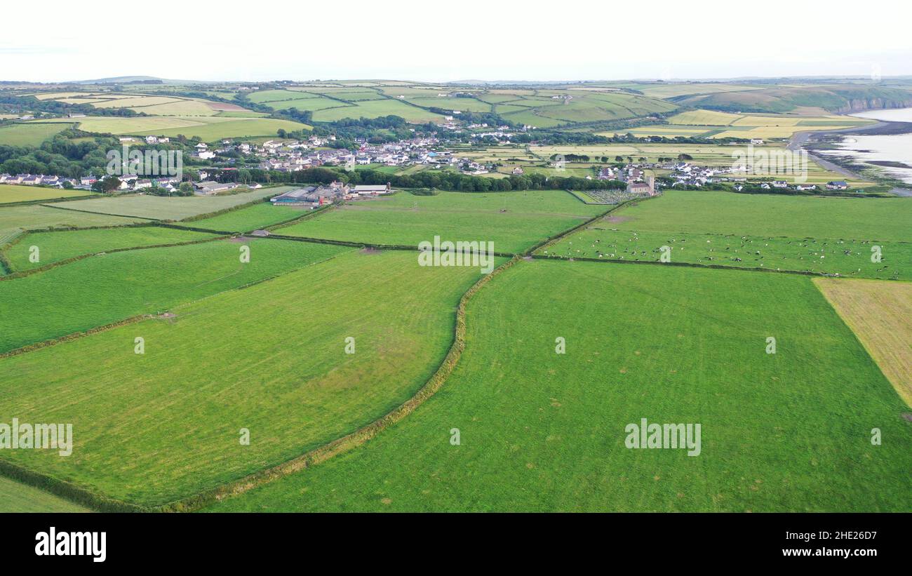Aerial image looking over fields to the village of Llanon, showing the ...
