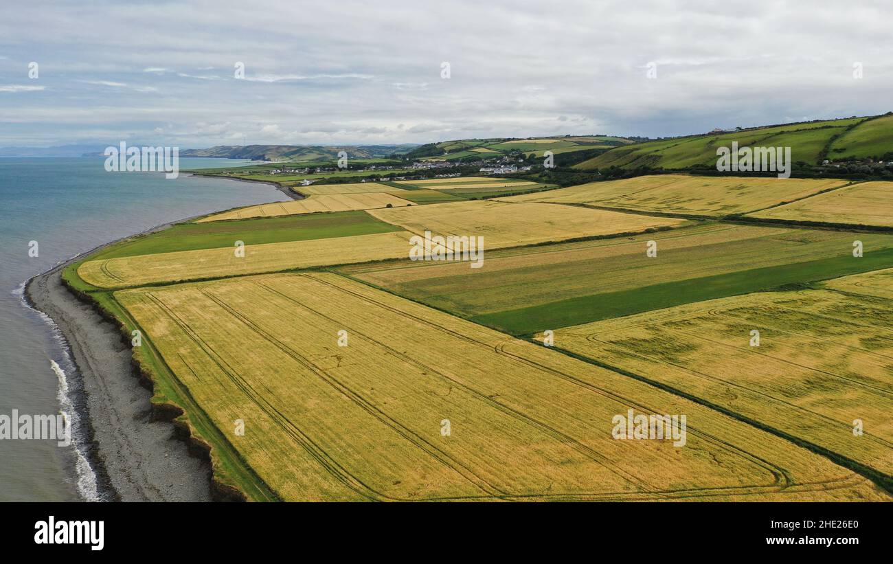 Aerial image looking over fields to the village of Llanon, showing the ...