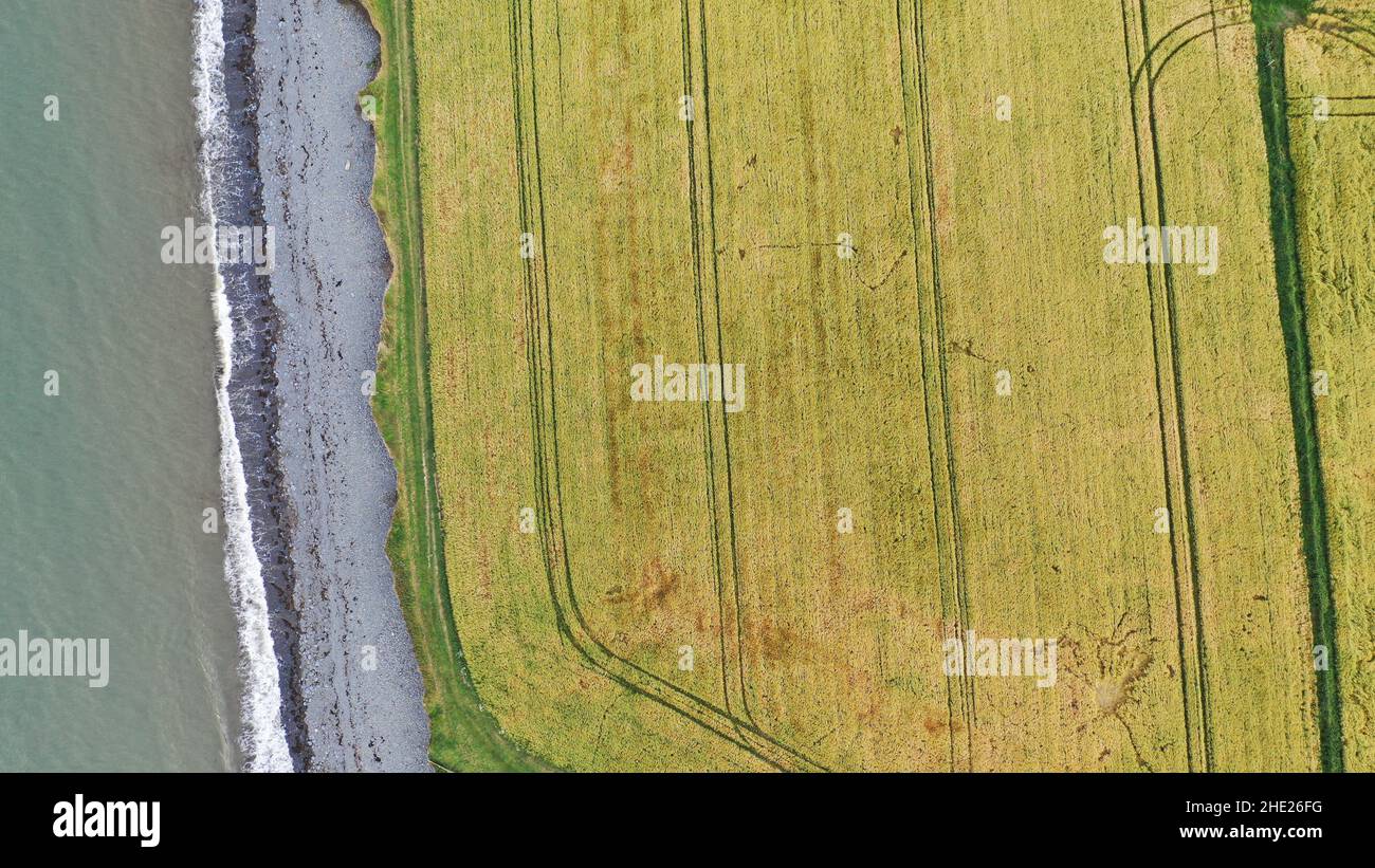 Aerial image of fields, beach and coastal path in Llanon Ceredigion ...