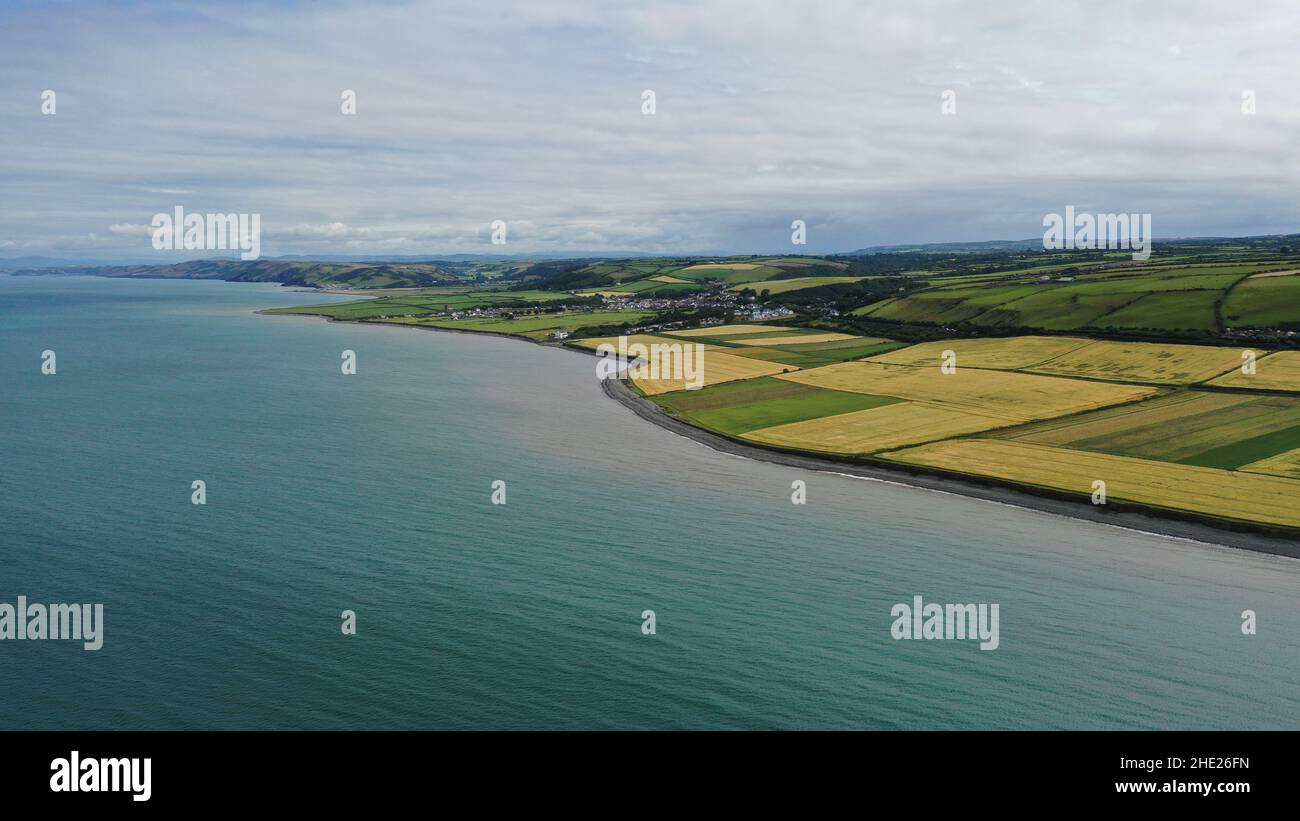 Aerial image looking over fields to the village of Llanon, showing the ...