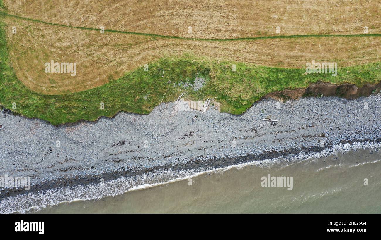 Aerial image of fields, beach and coastal path in Llanon Ceredigion ...
