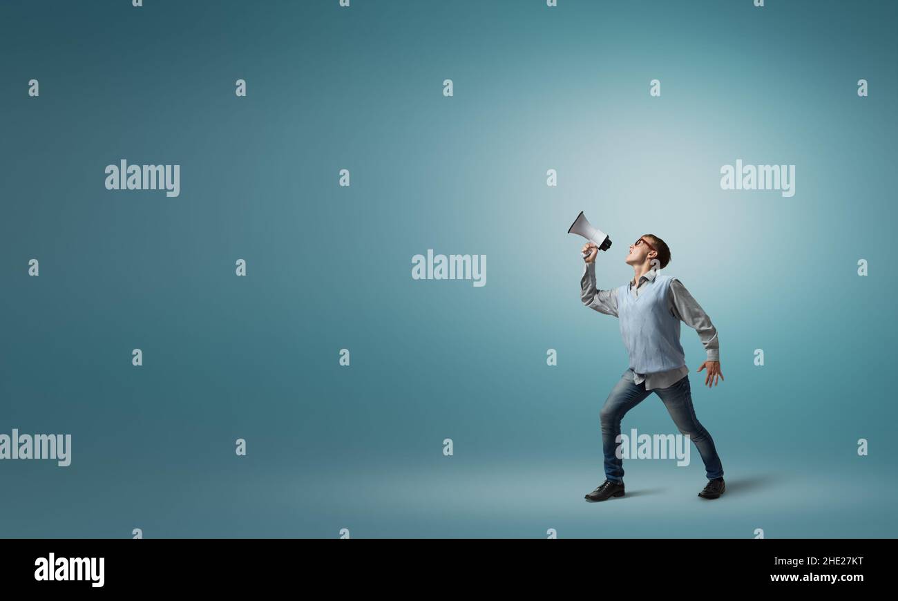 Boy with megaphone Stock Photo - Alamy