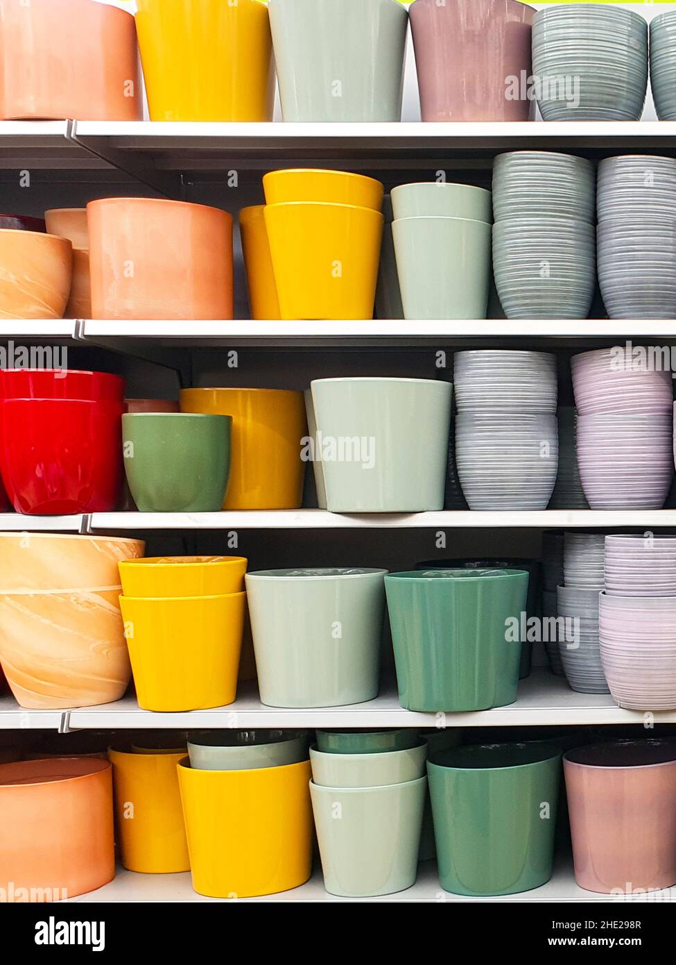 Many Flower pots in the supermarket, full color Stock Photo - Alamy