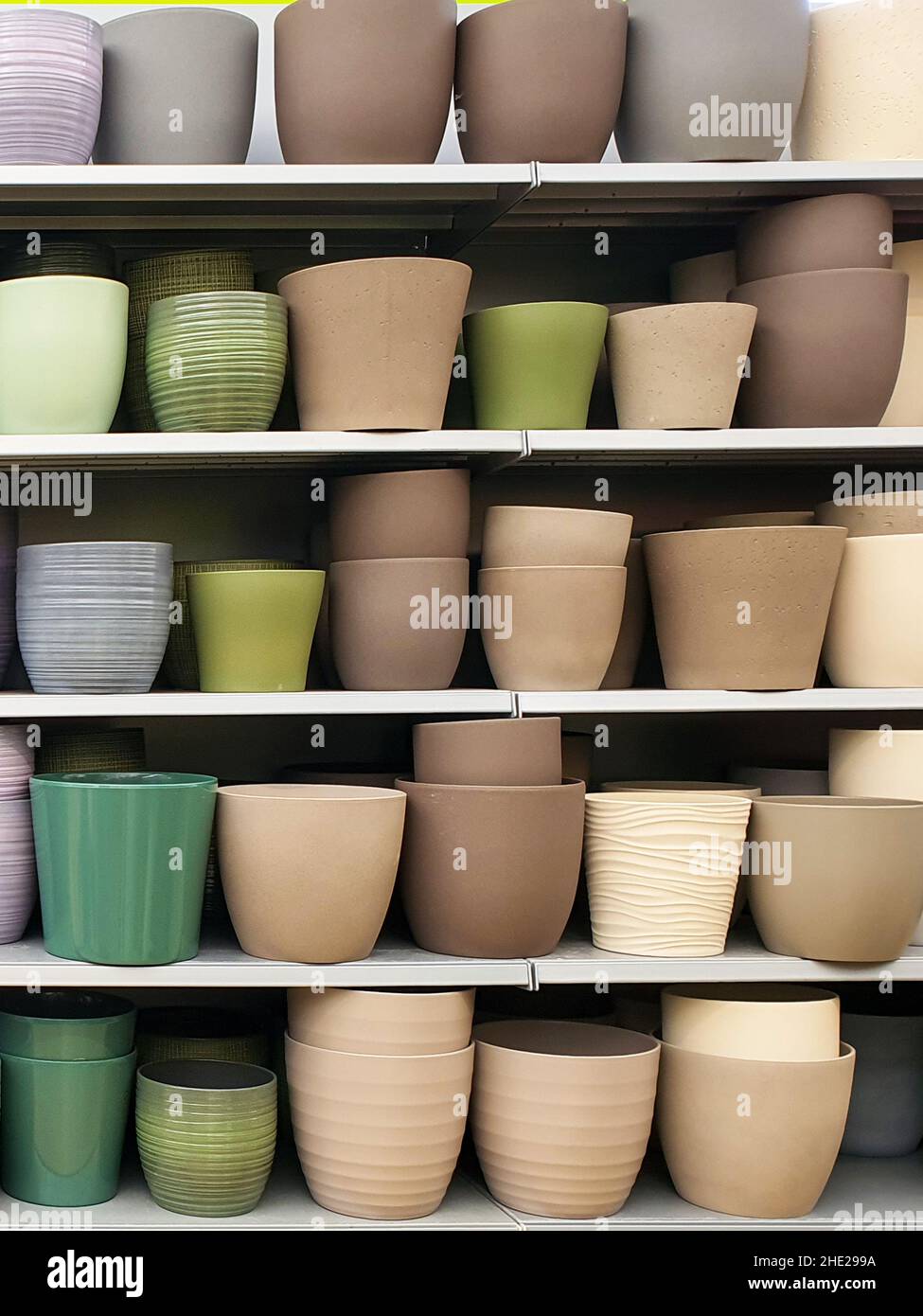 Many Flower pots in the supermarket, full color Stock Photo - Alamy