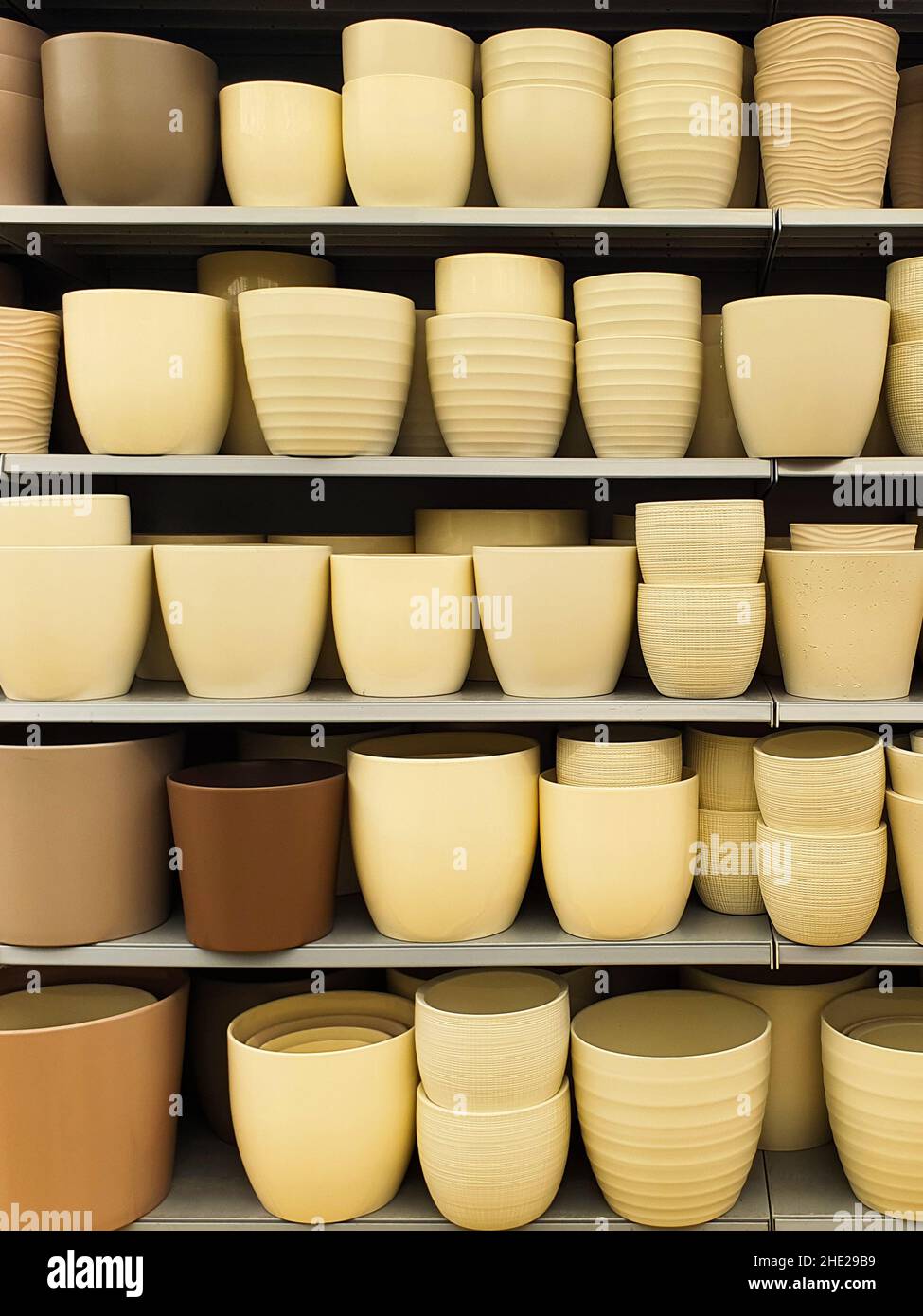 Many Flower pots in the supermarket, full color Stock Photo - Alamy