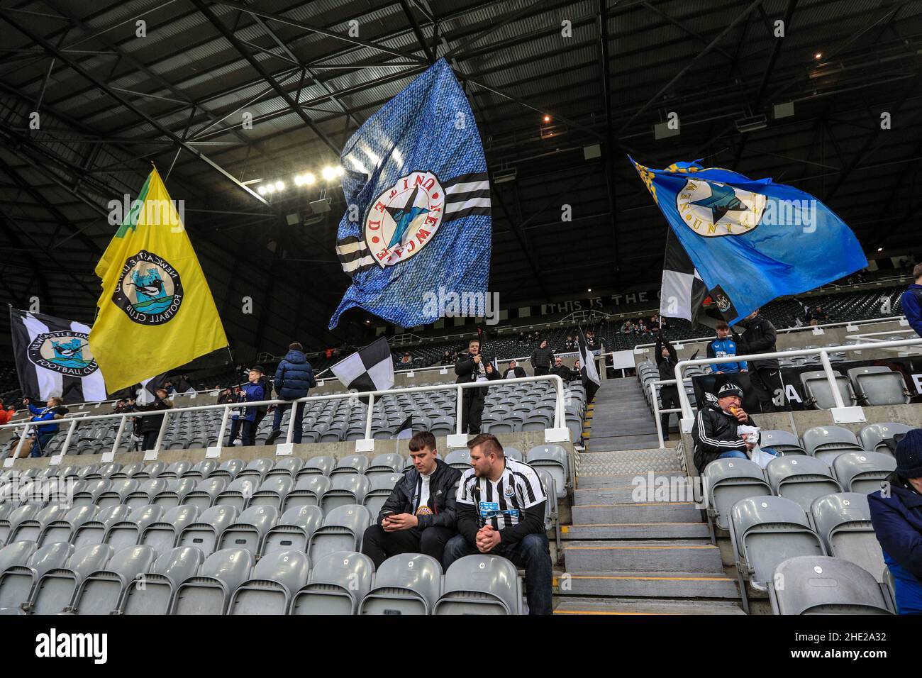Newcastle United supporters fly their flags inside St James' Park ...