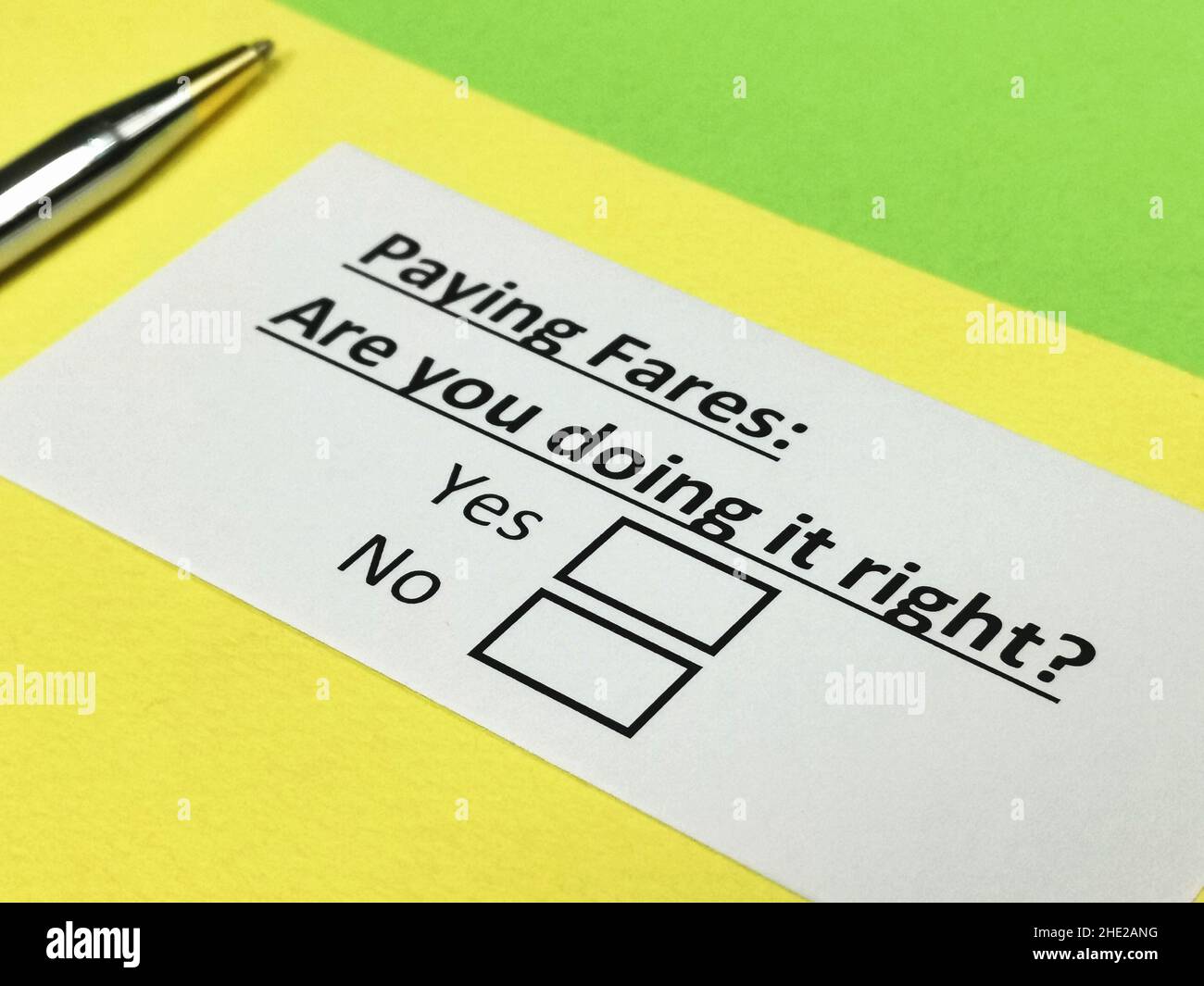 One person is answering question about paying fares Stock Photo - Alamy