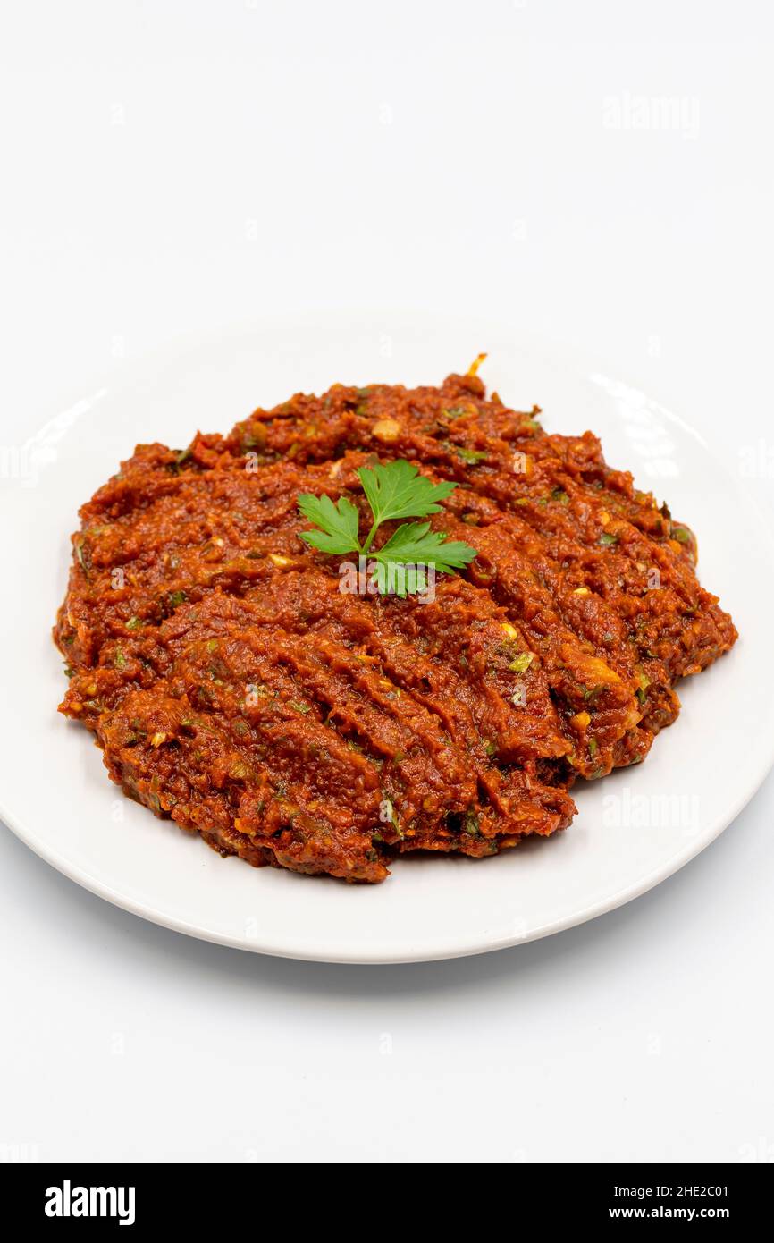 Chili paste on a white background. spicy paste. A kind of adjika ...